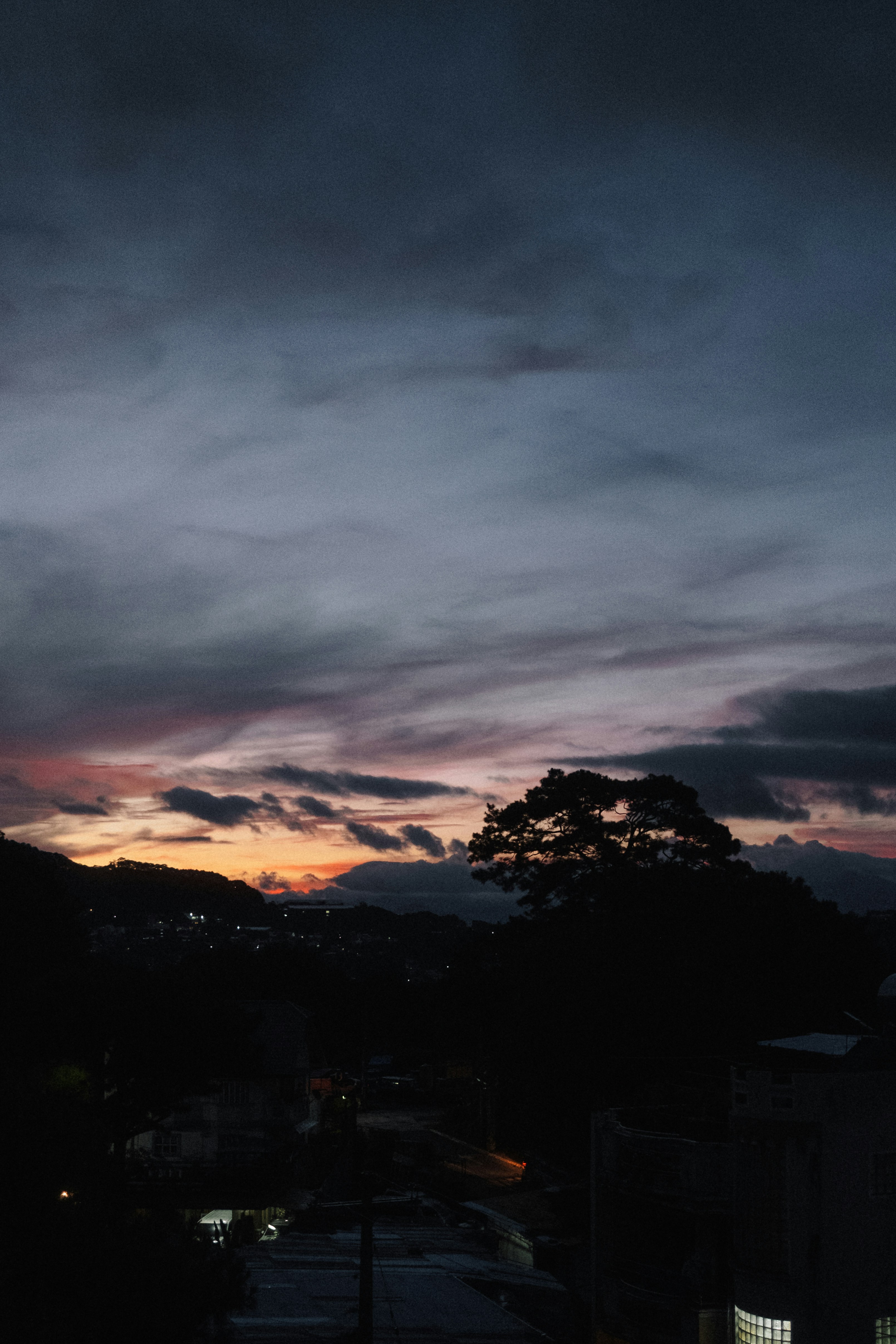 Twilight Silhouette Over Quiet Hills