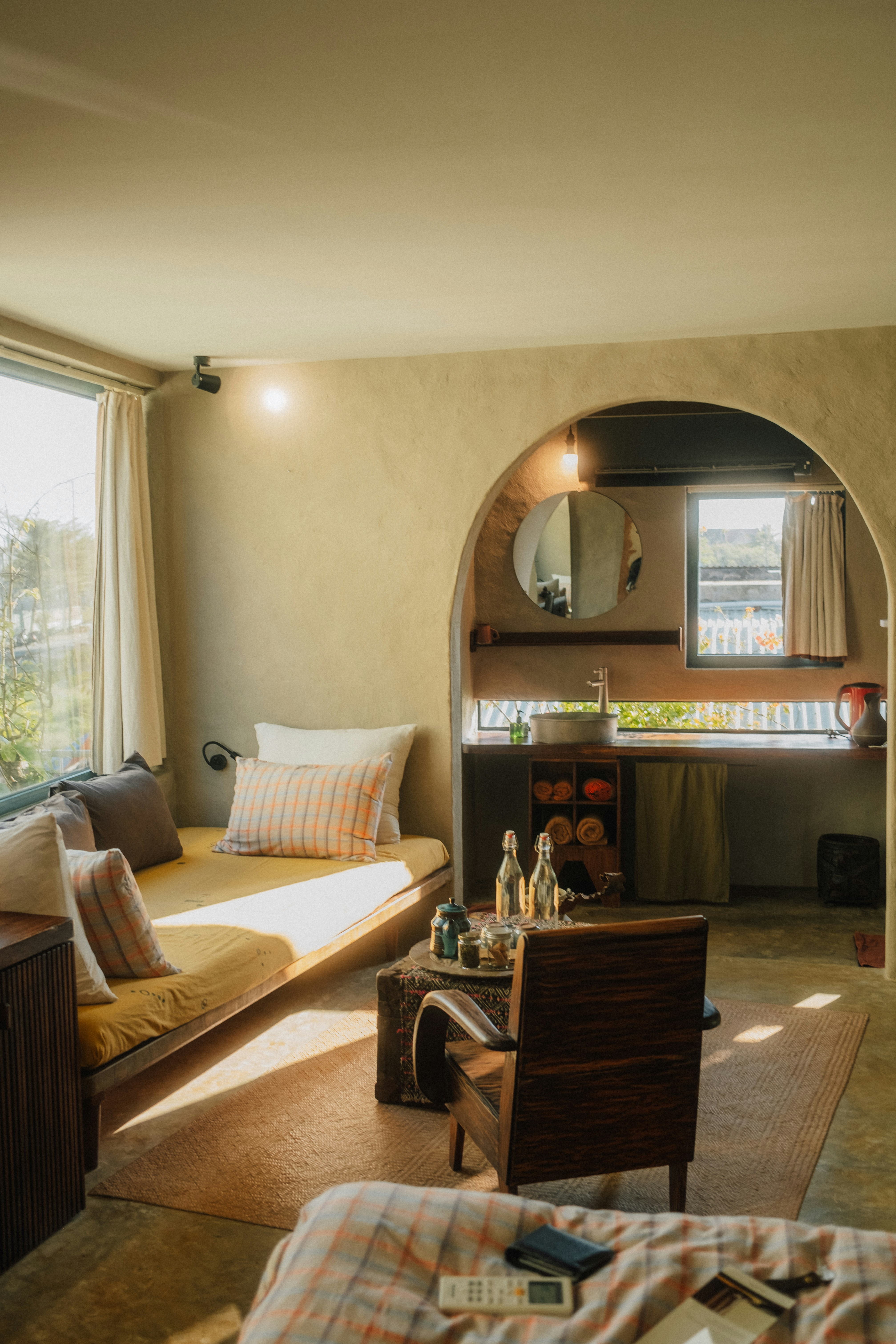 Sunlit Seating Nook Through Archway
