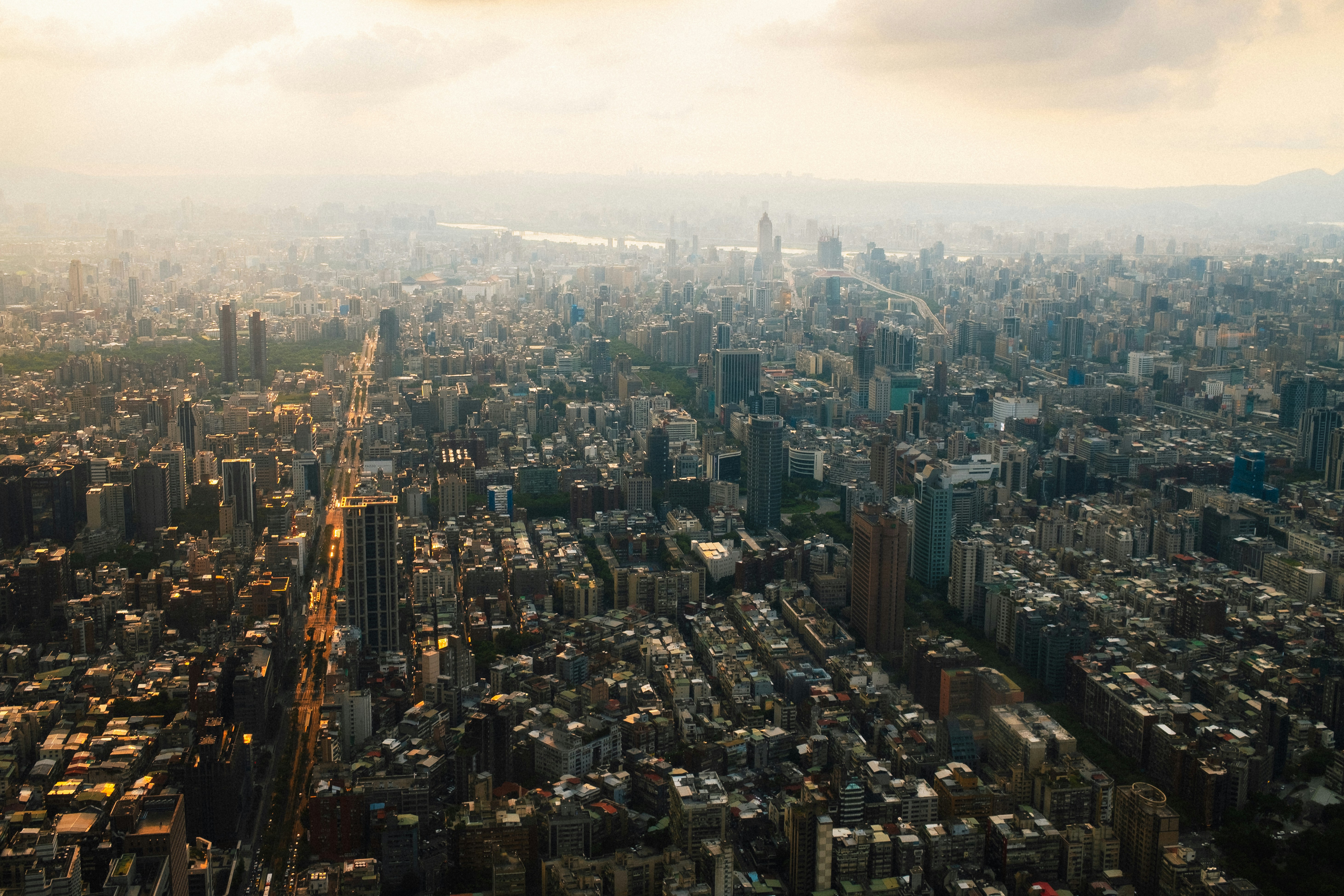 Urban Tapestry: A Rooftop View Over a Dusk-Softened Metropolis
