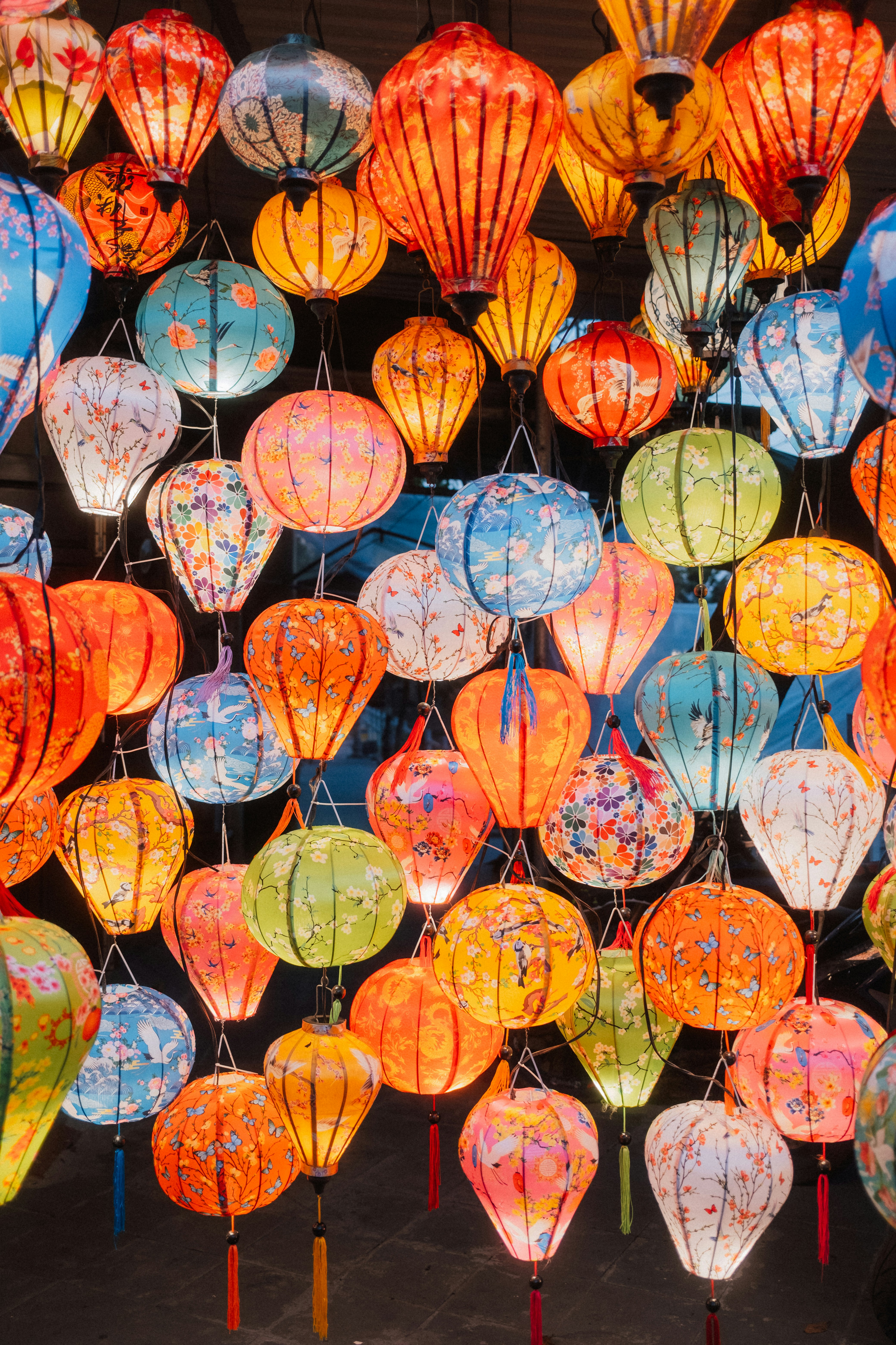 Lantern Garden: A Sea of Colorful Orbs Floating in Amber Light