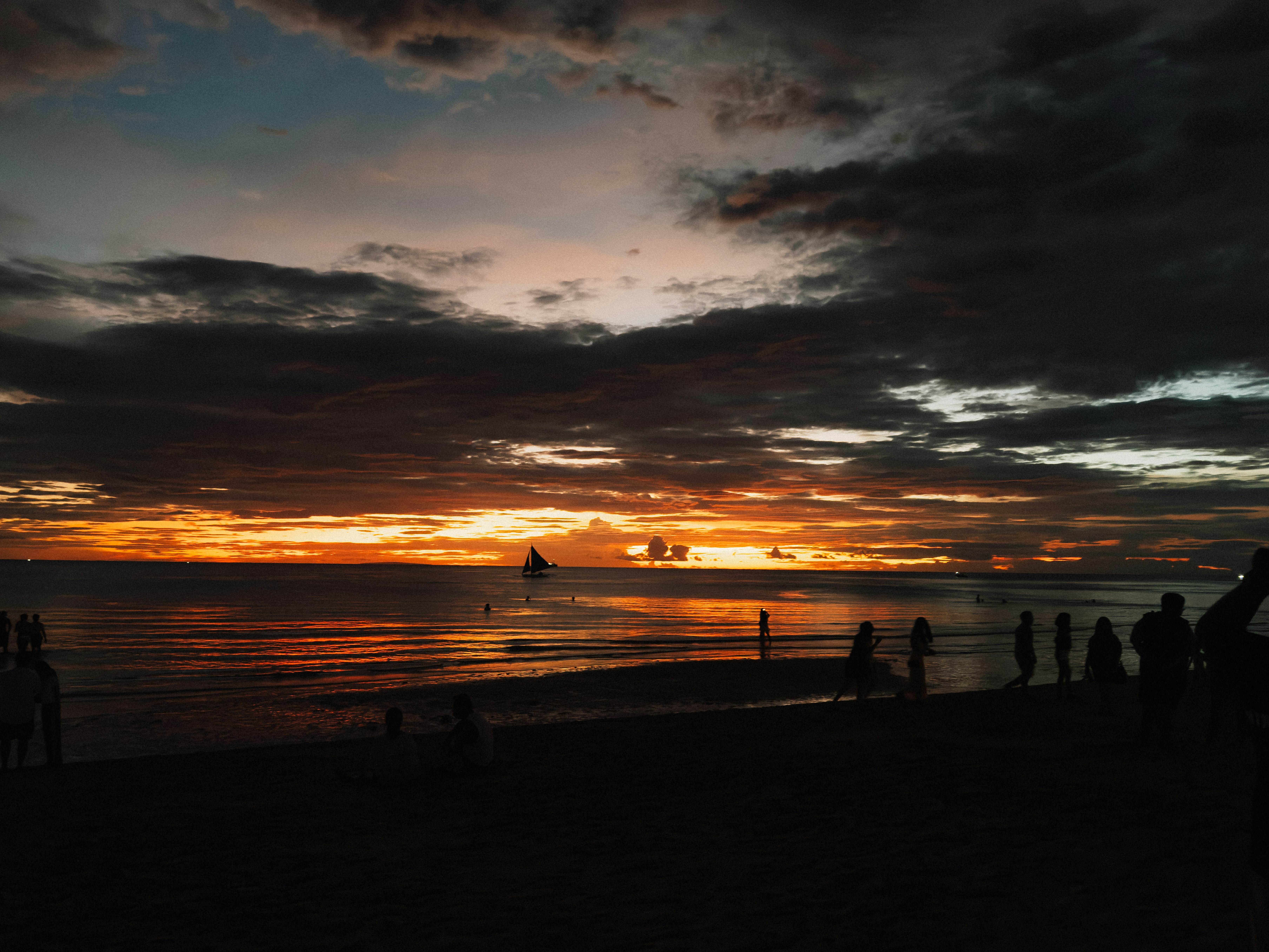 Twilight Toward the Sea: Silhouettes at a Quiet Beach