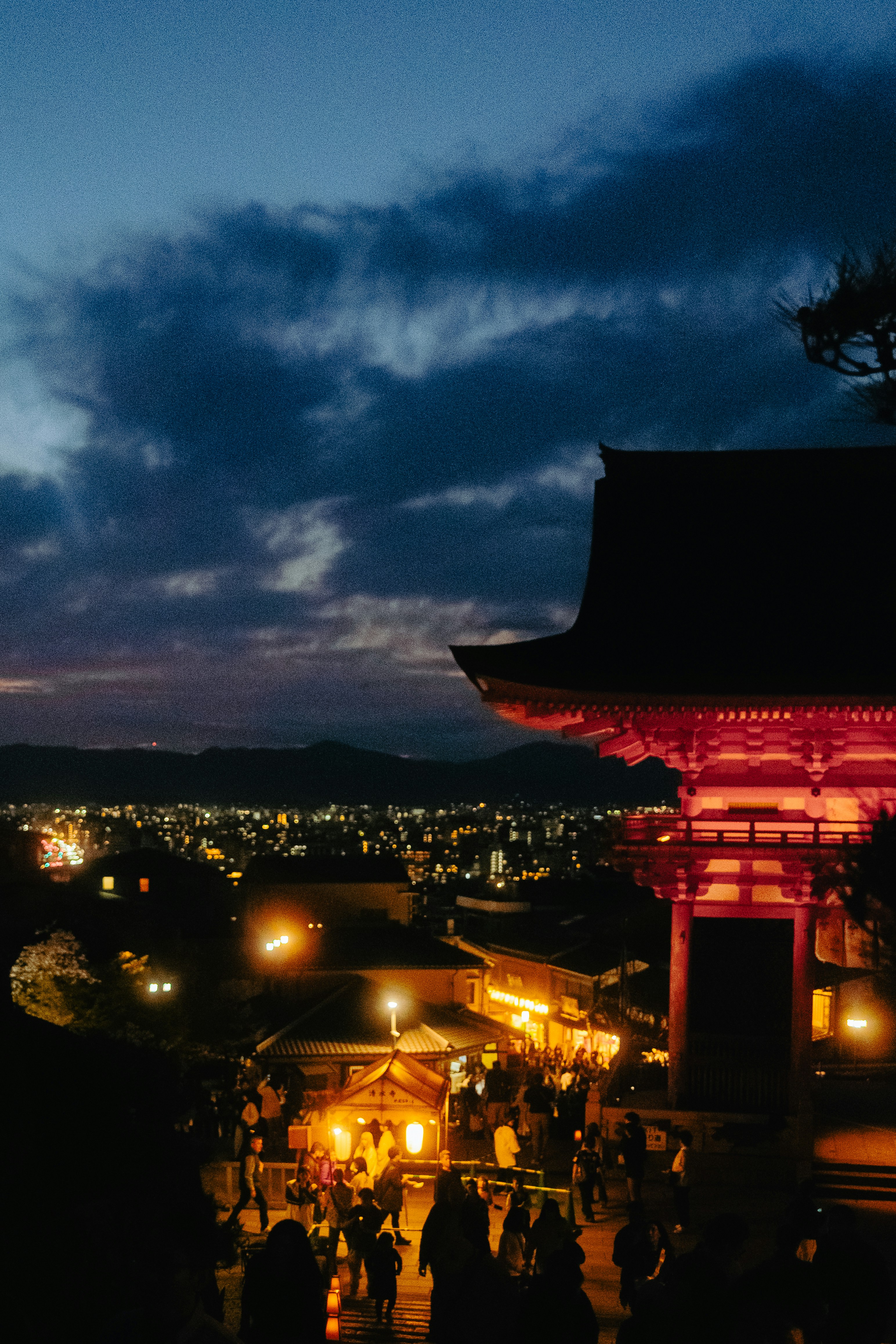 Night Temple Gate: City Glow Beneath Kyoto’s Peak