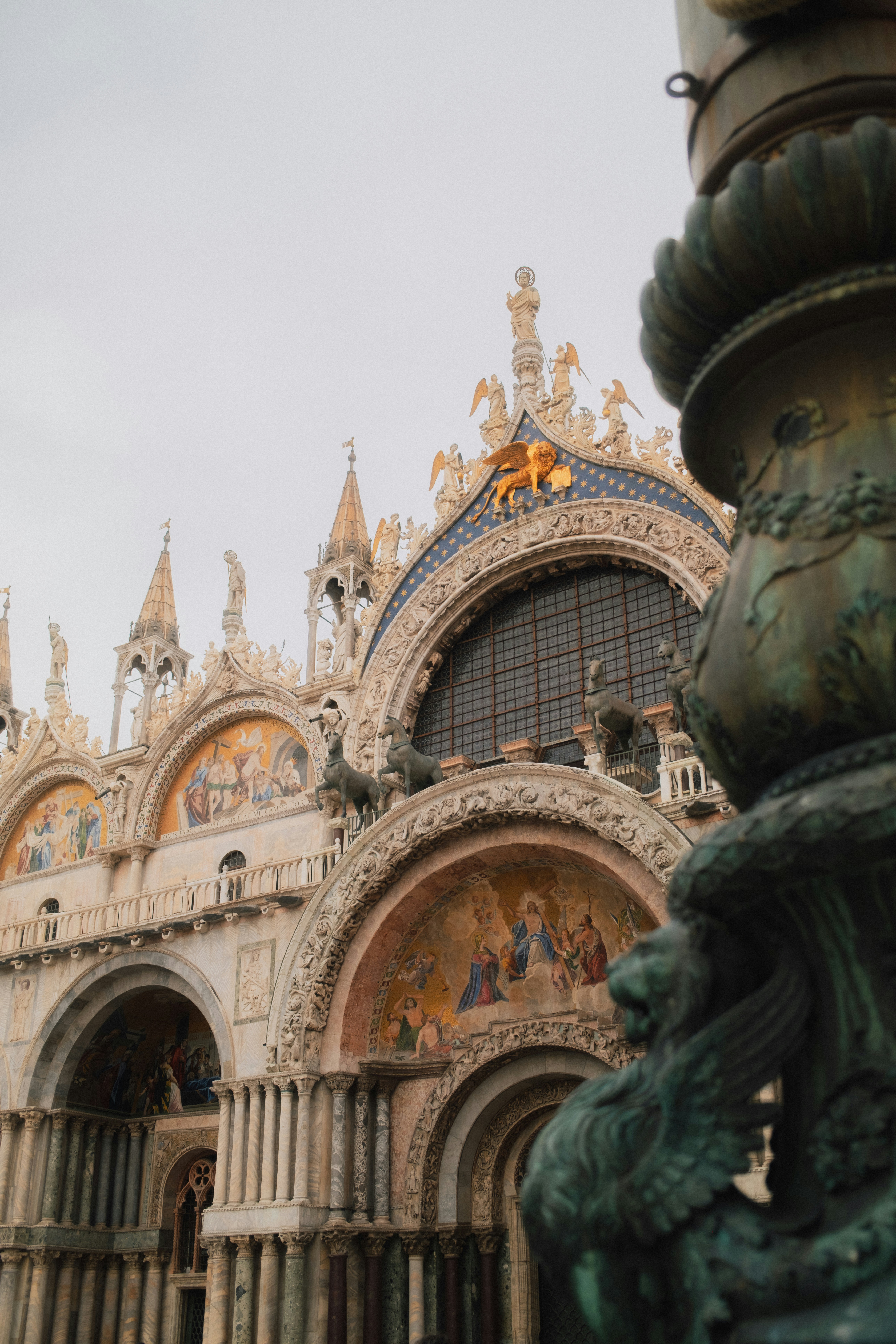 Ornate Facade in Focus: Detail of San Marco’s Carved Glory