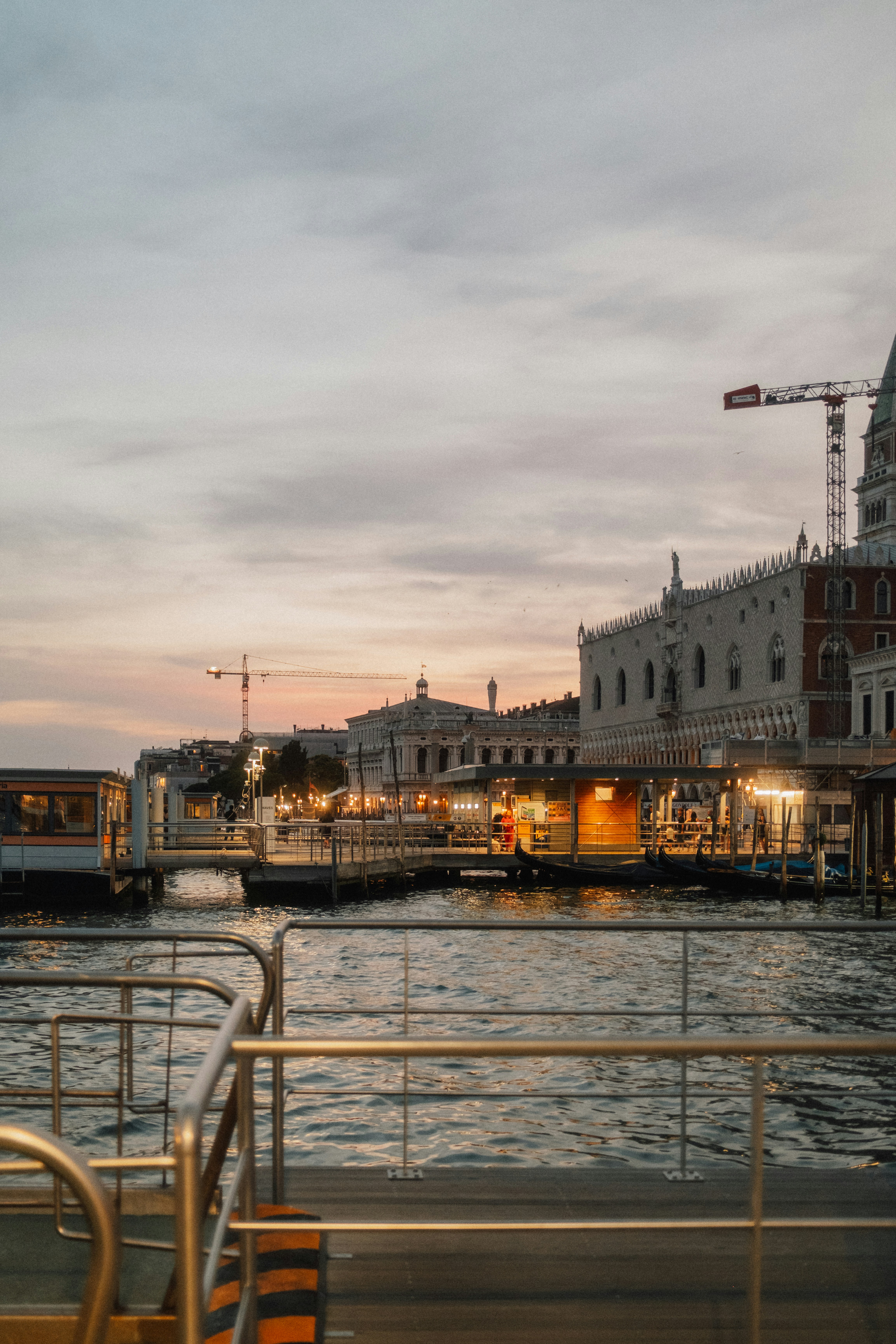 Evening Quay: Lights on the Venetian Waterfront