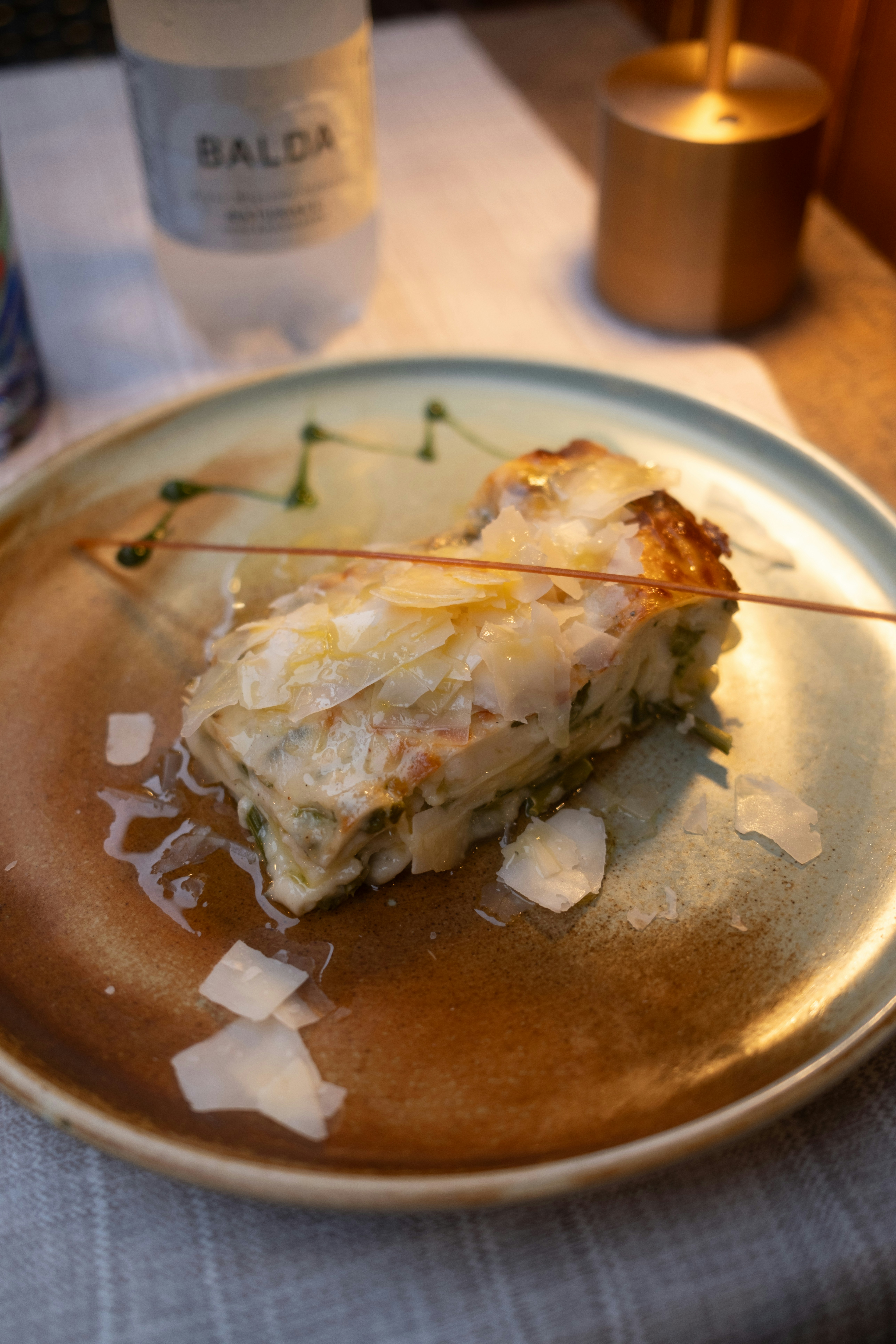 Flaky Crowned Dessert on a Glazed Plate