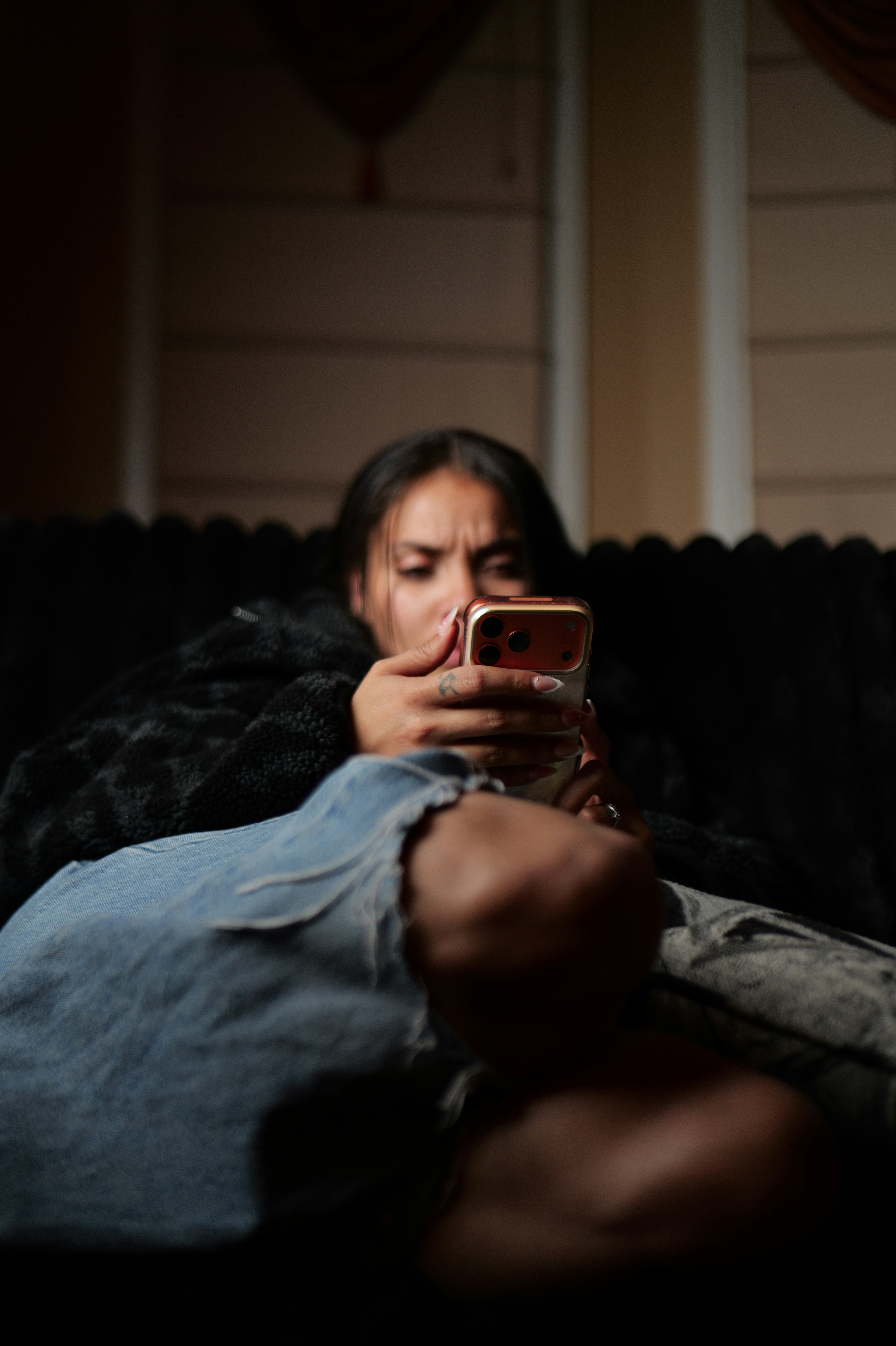 Phone in Focus: A Quiet Moment on the Couch