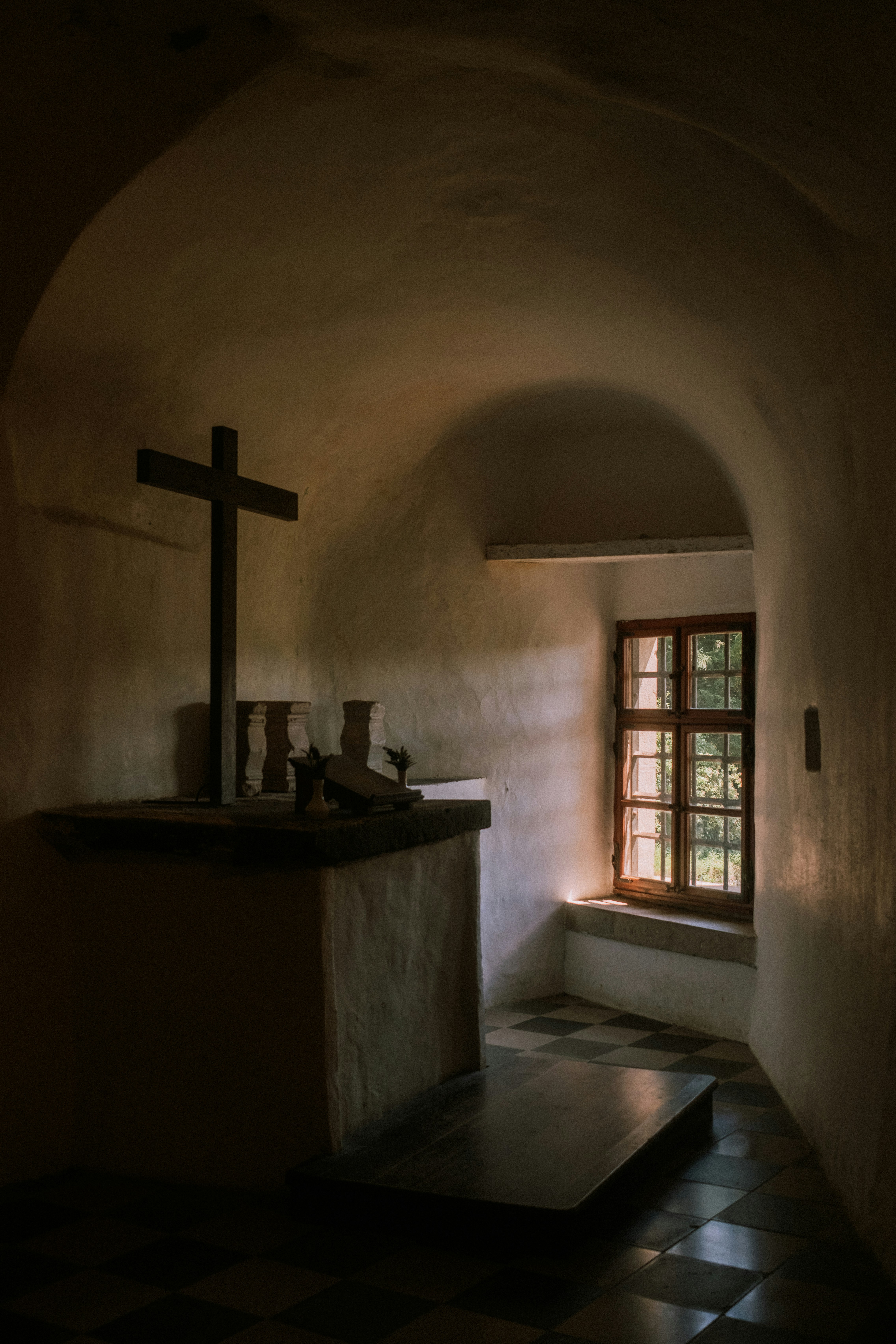 Soft Light in a Tiny Chapel: Cross, Window, and Quiet Ambience