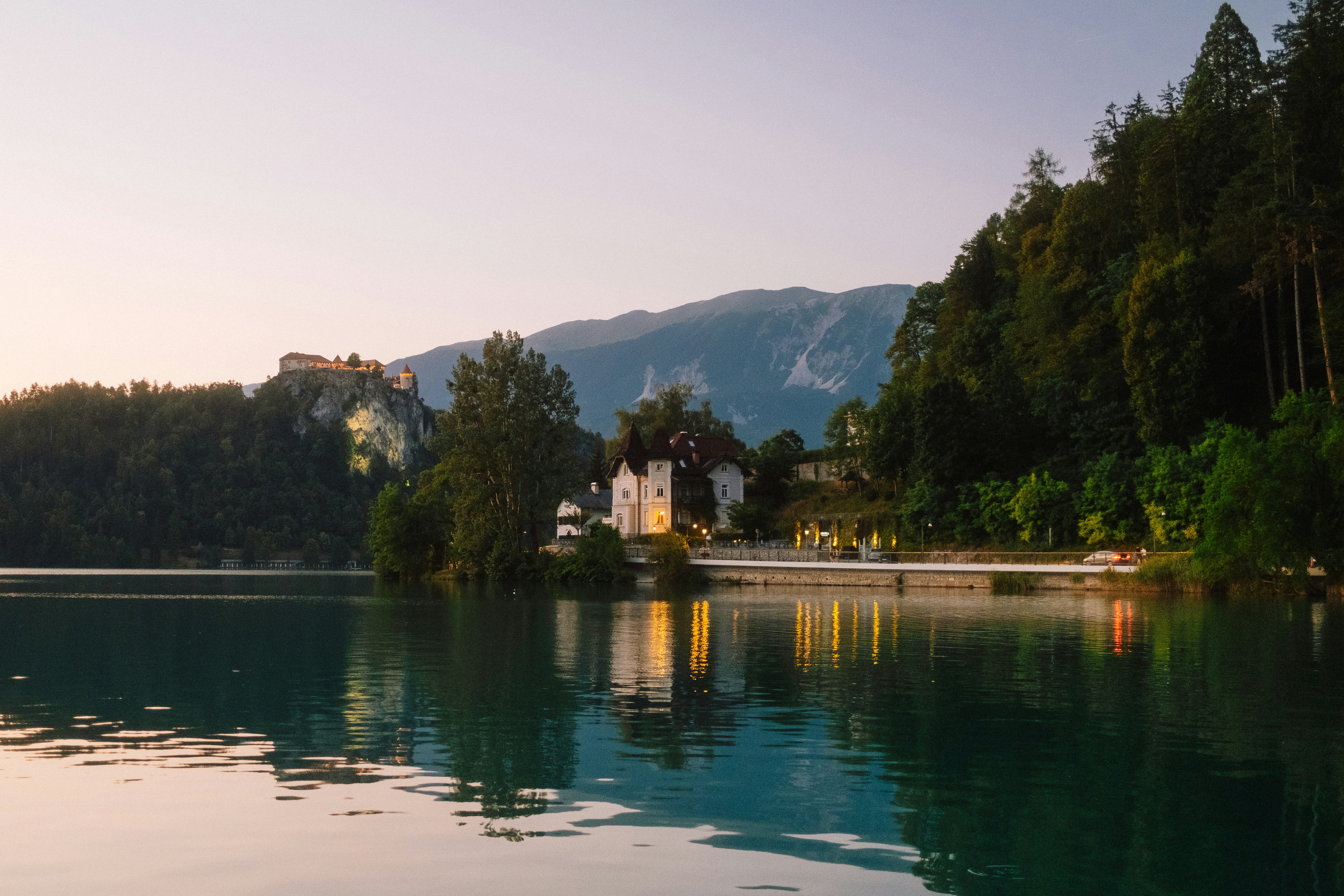 Lakeside Castle at Dusk: A Quiet Shoreline Serenade
