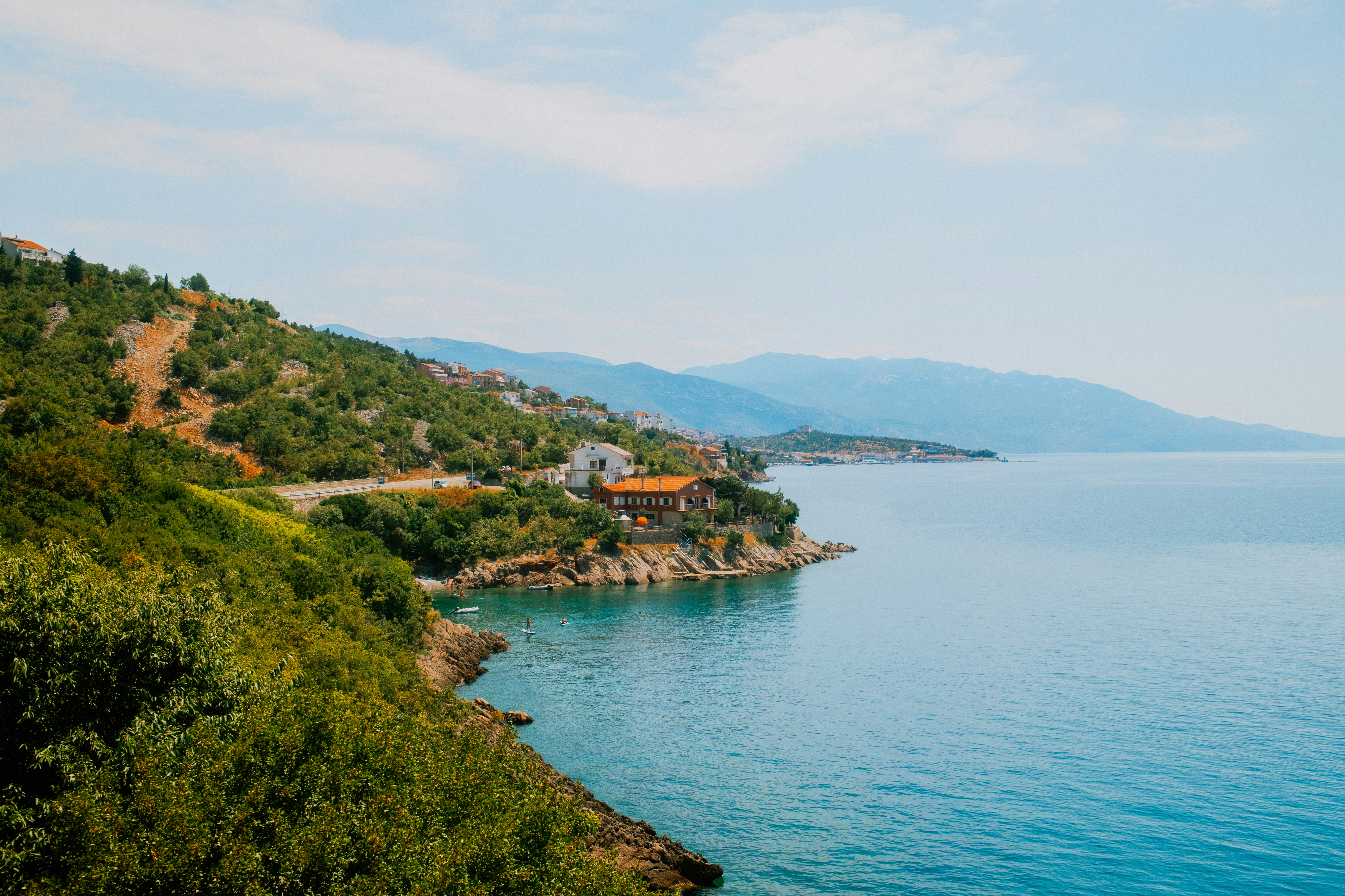 Coastal Village Nestled Along the Clear Aegean: A Quiet Riviera Vista