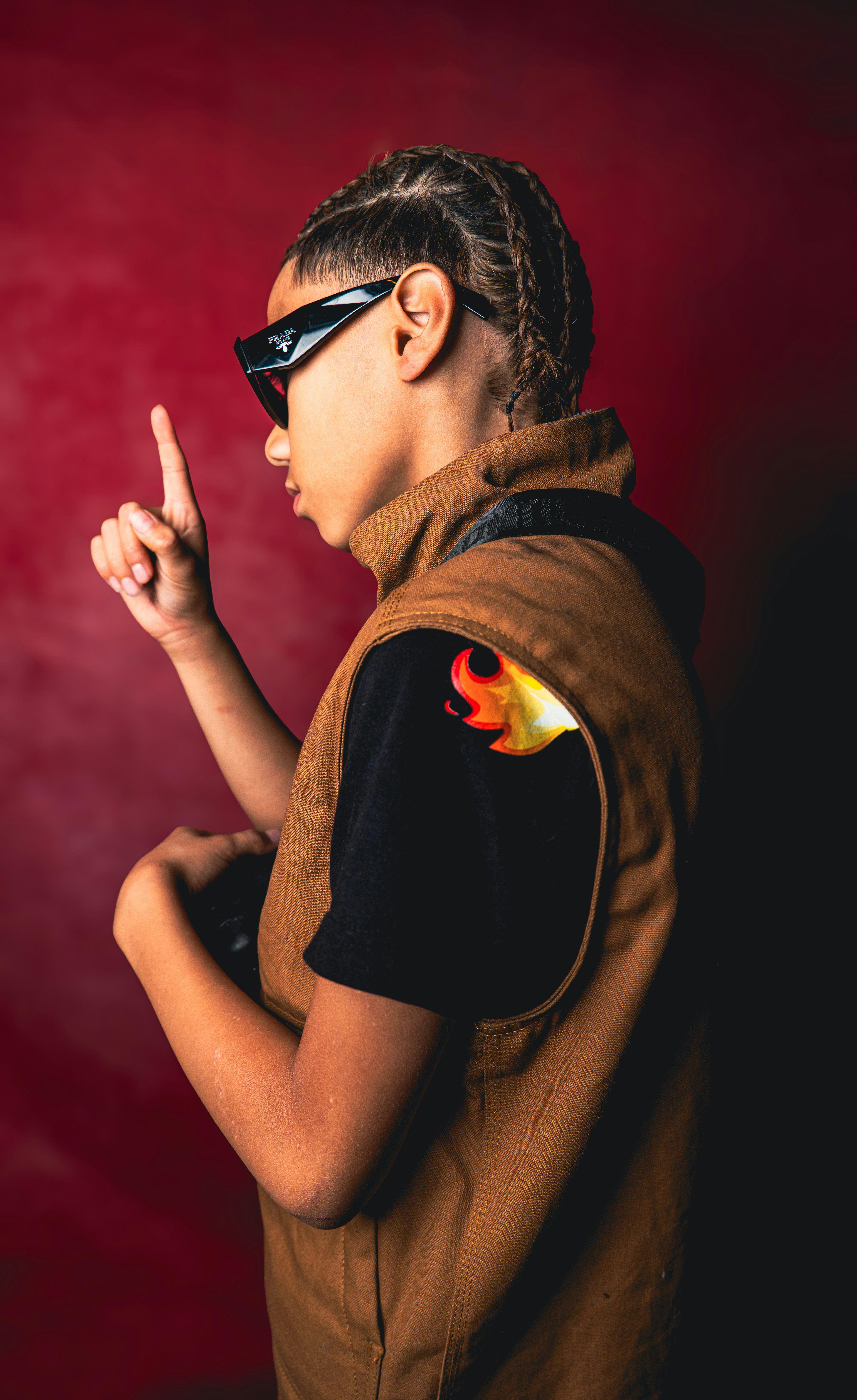 Silhouette of Focus: A Side Portrait in Scarlet Glow