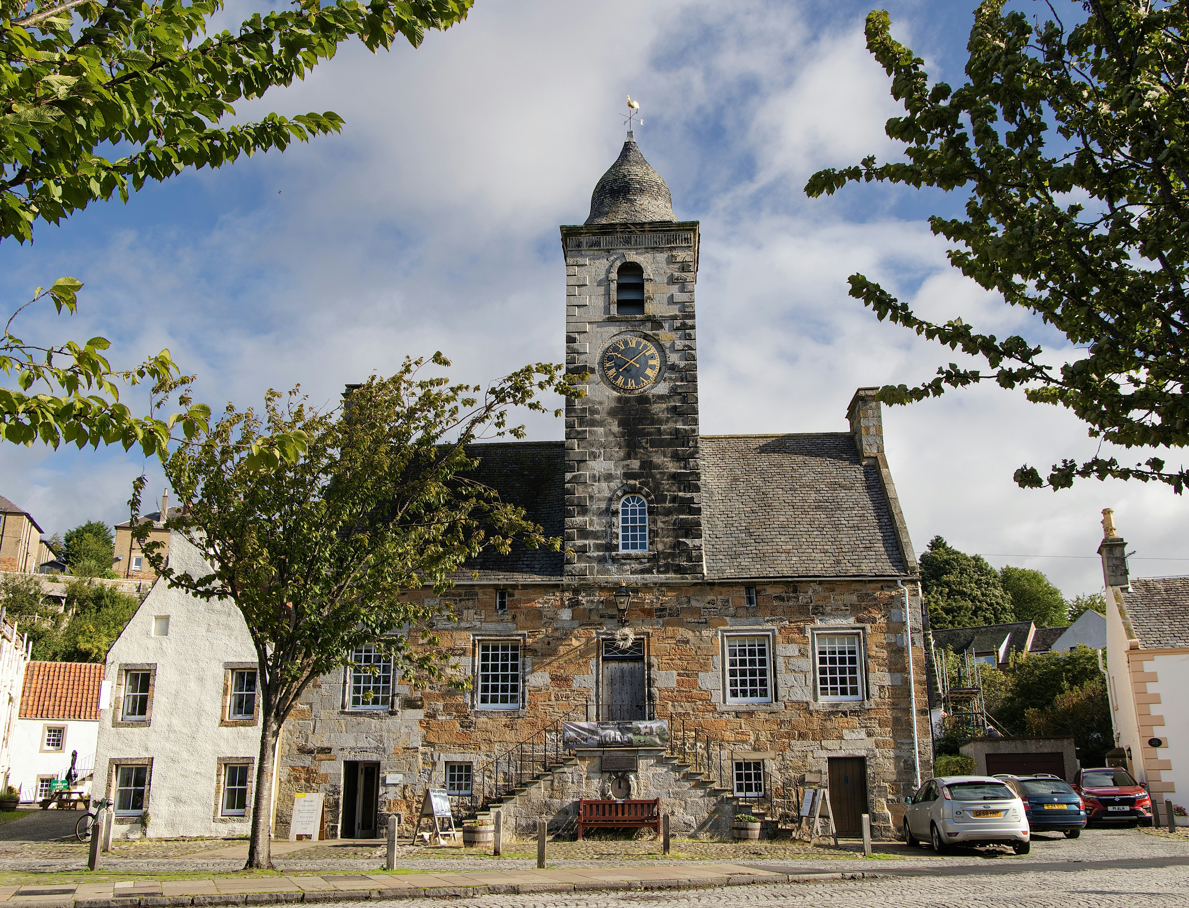 Timeless Town Hall: Stone Facade Under a Clock Tower