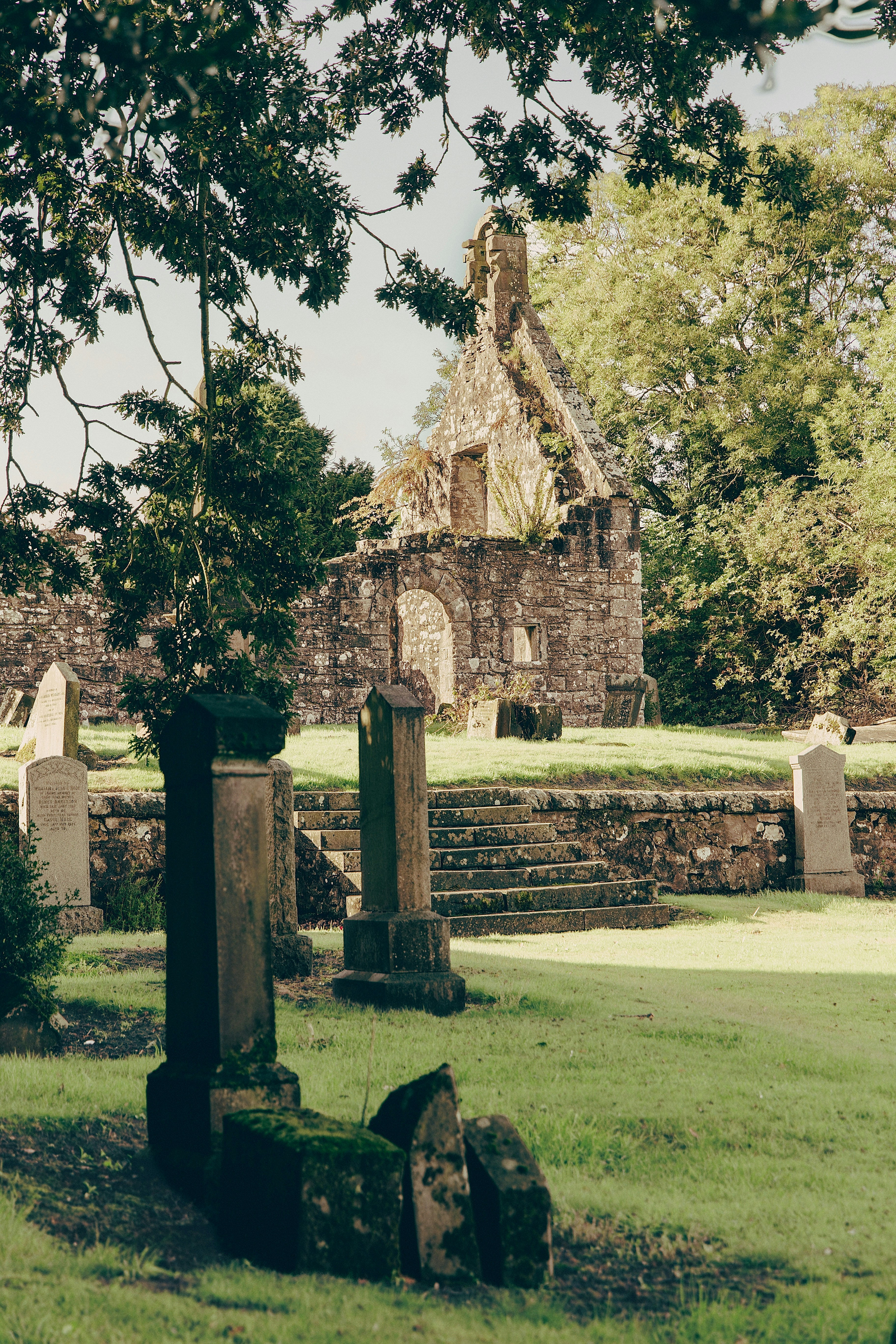 Ruined chapel over a tranquil graveyard