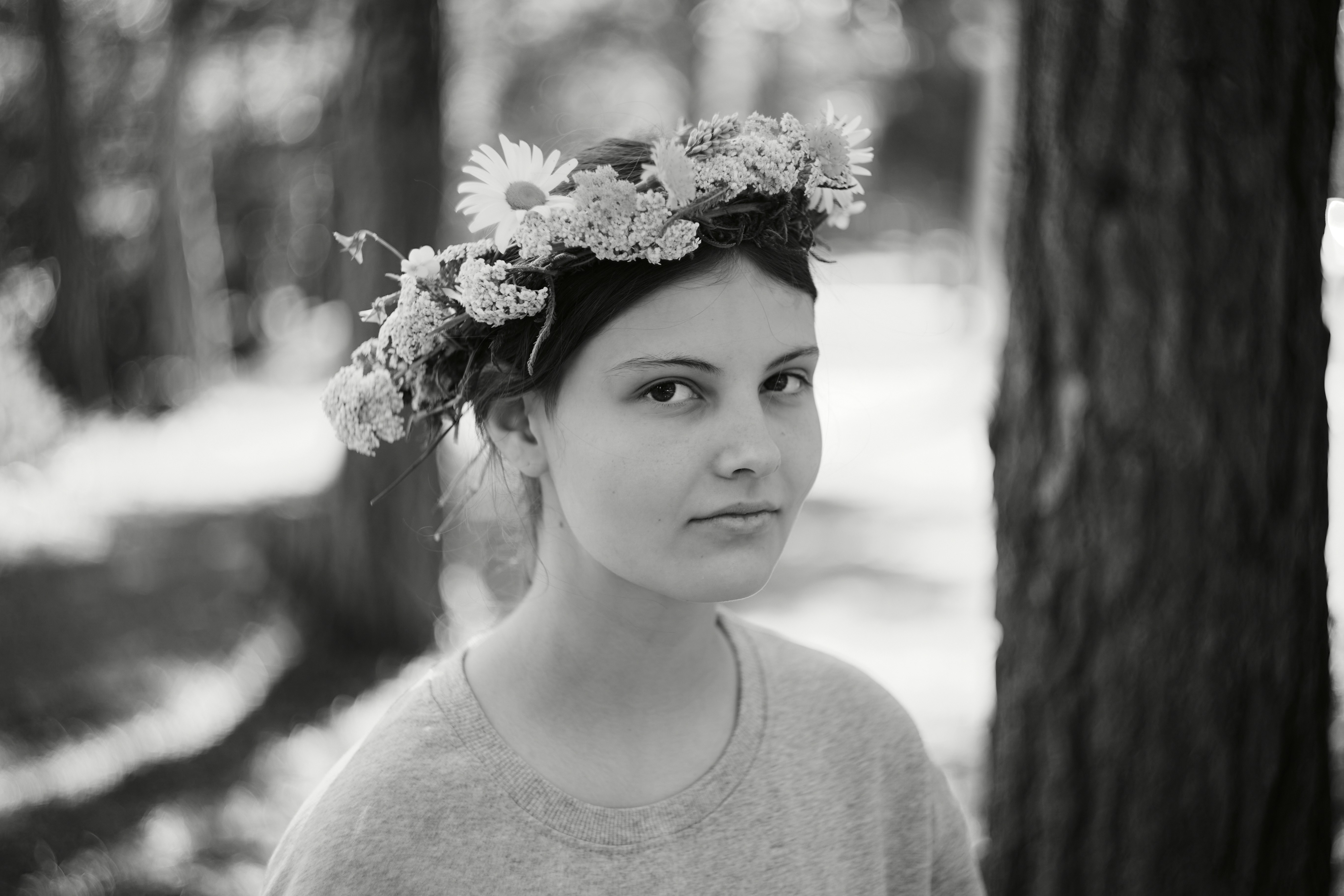 Floral Crown and Soft Light on a Quiet Forest Portrait
