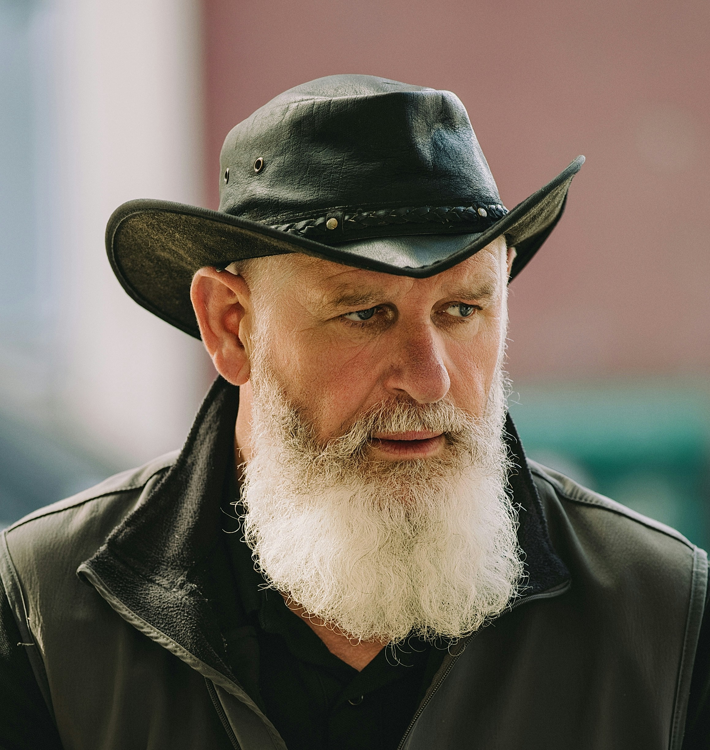  Weathered Wisdom: Portrait of a Gentleman in a Charcoal Hat