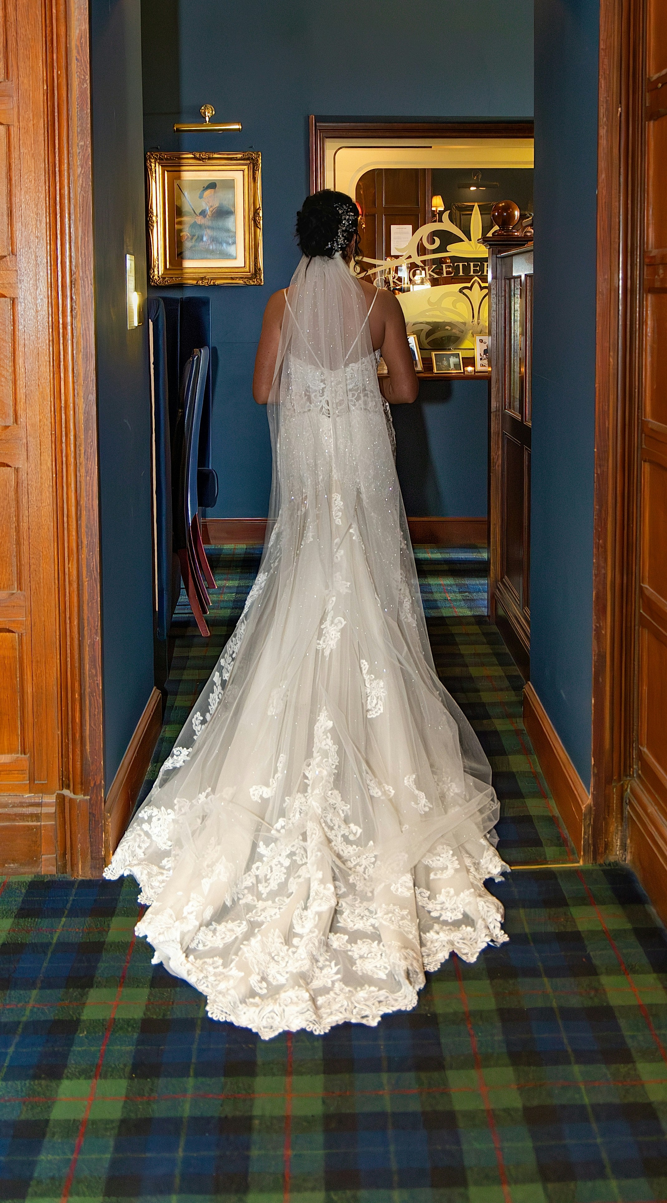 Veiled Bride Steps into the Gallery Hall