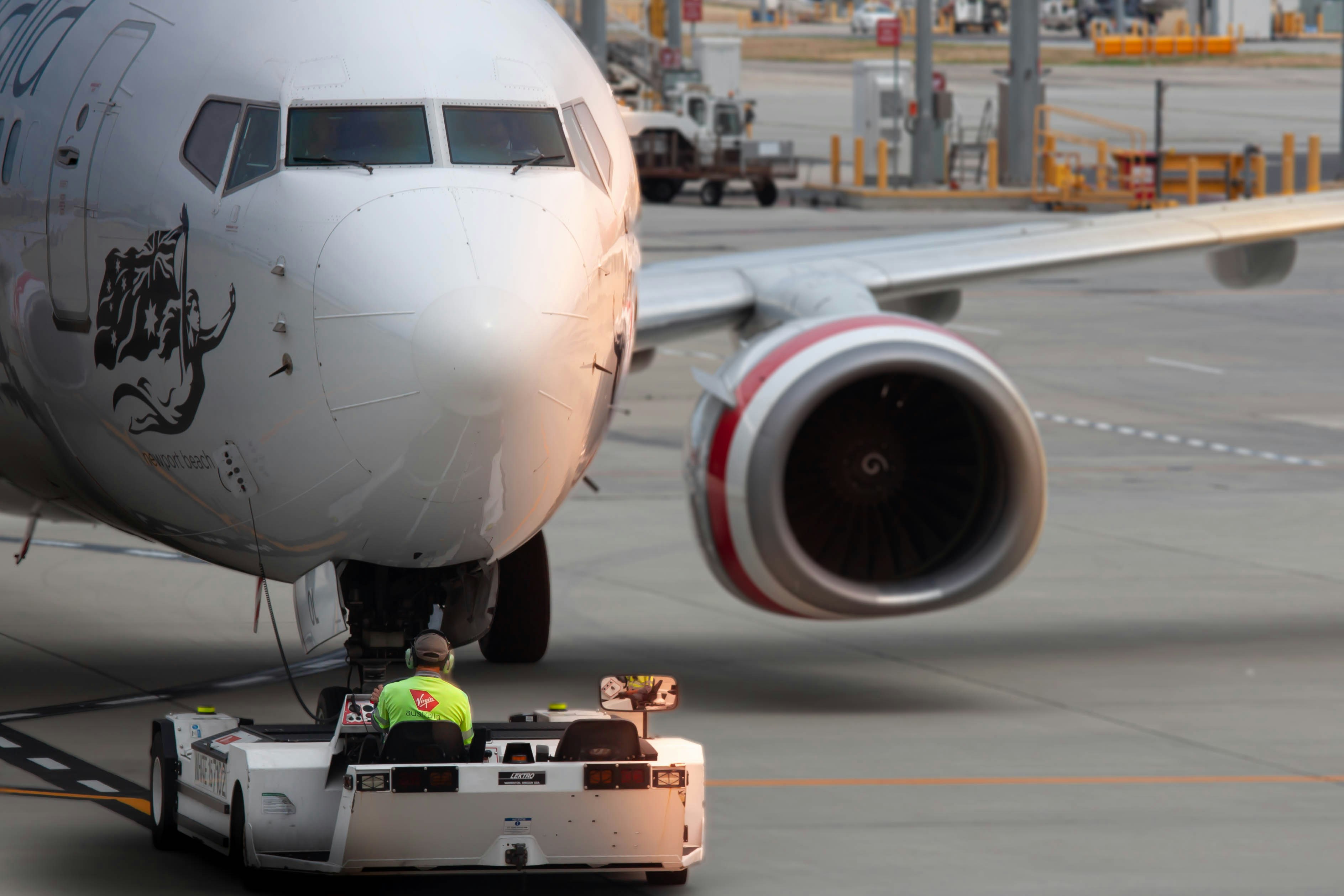 Ground Crew at Idle Power: A Jet’s Quiet Moment in the Gate