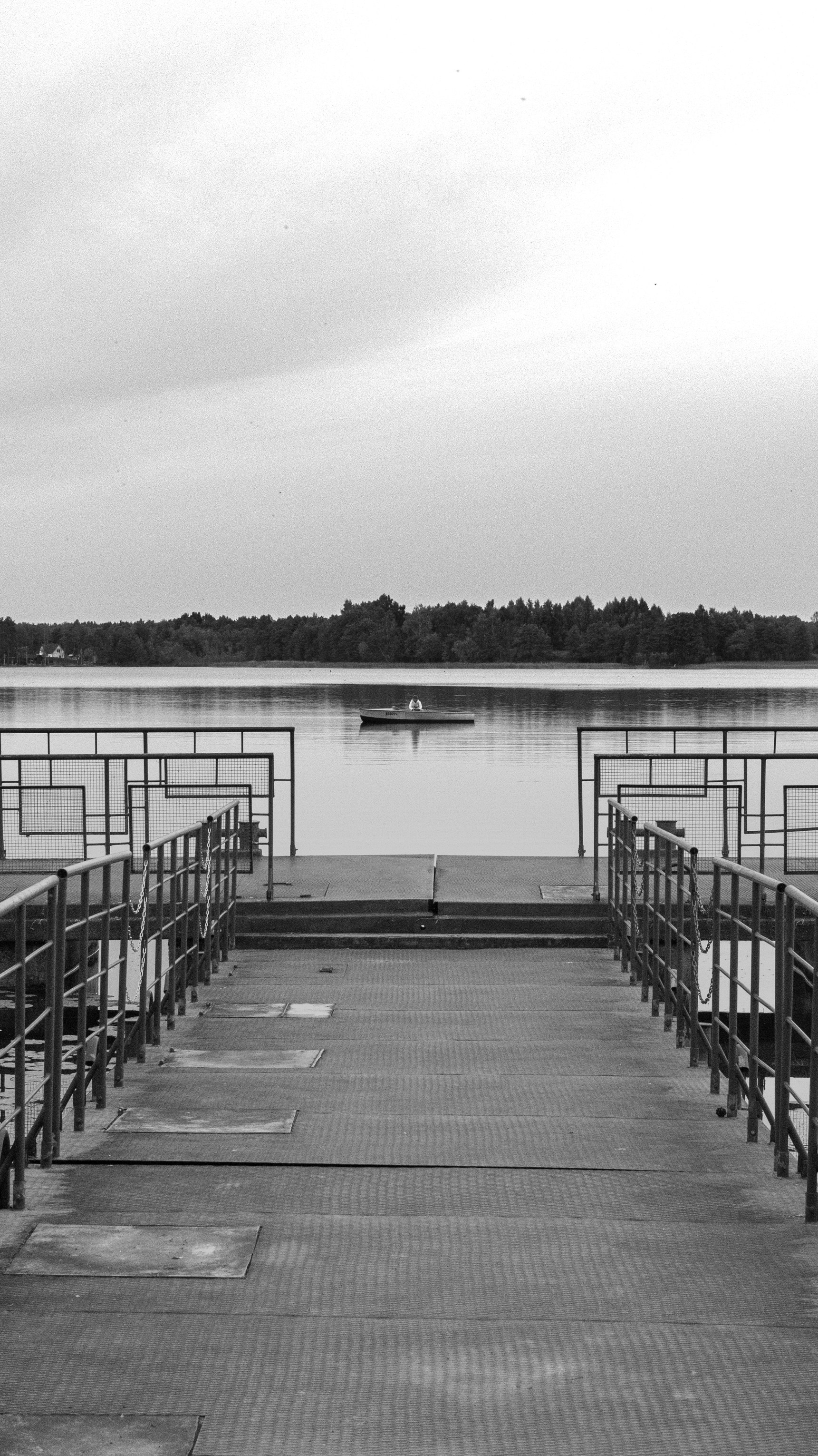 Symmetrical Pier to a Tranquil Lake