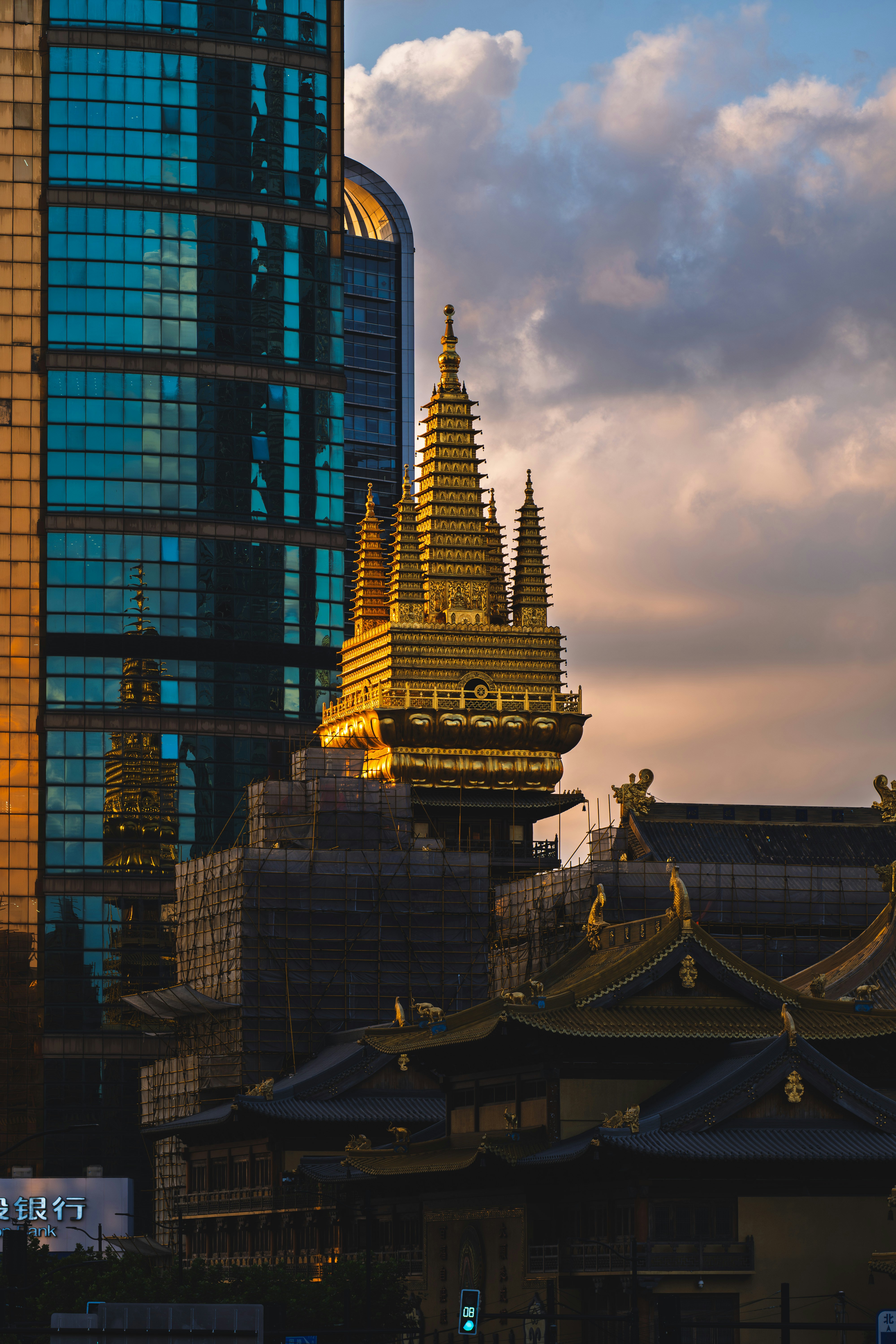 Golden Pagoda Rising Above Glass and Grit
