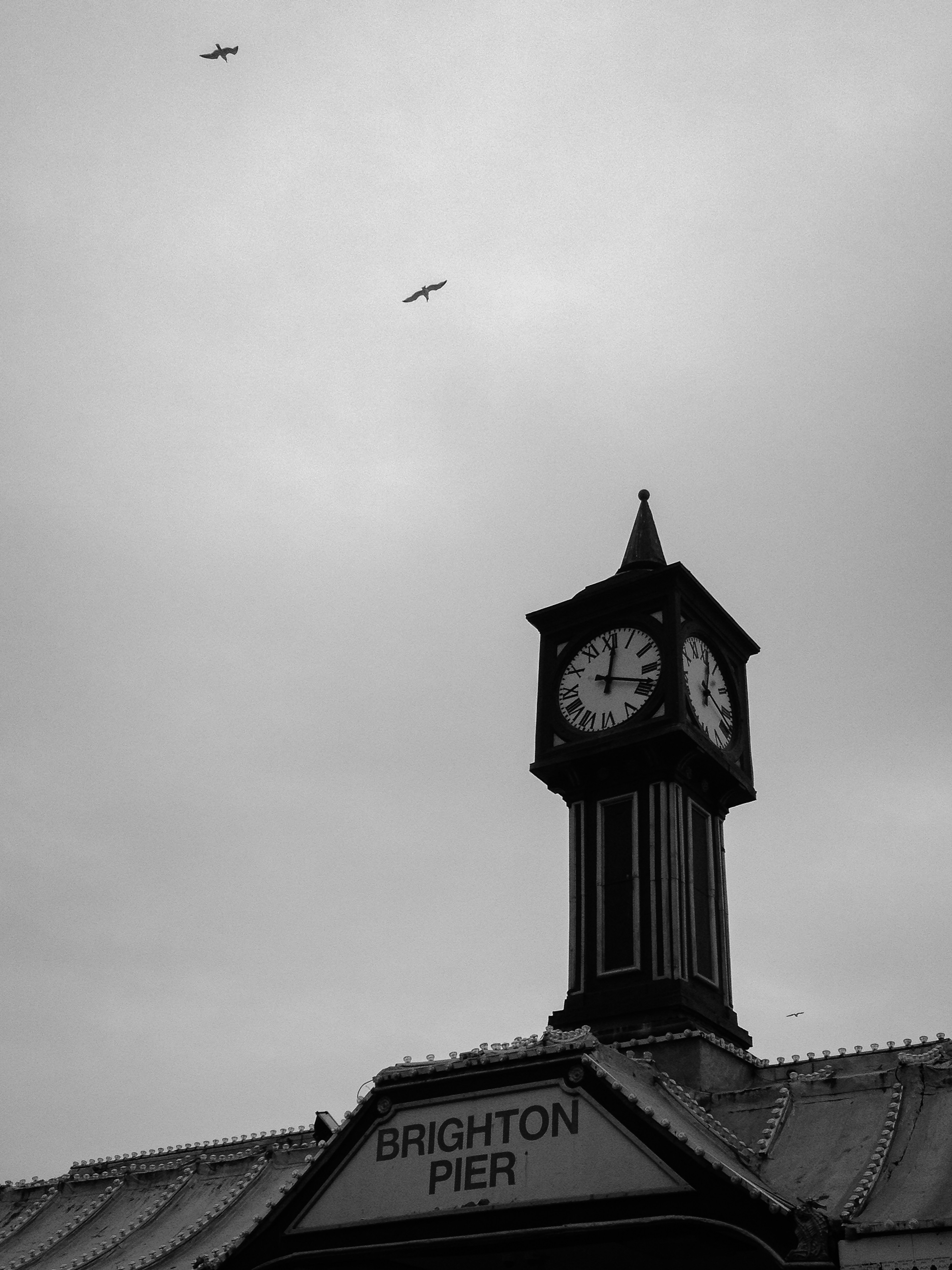 Clocktower at Brighton Pier under Quiet Skies