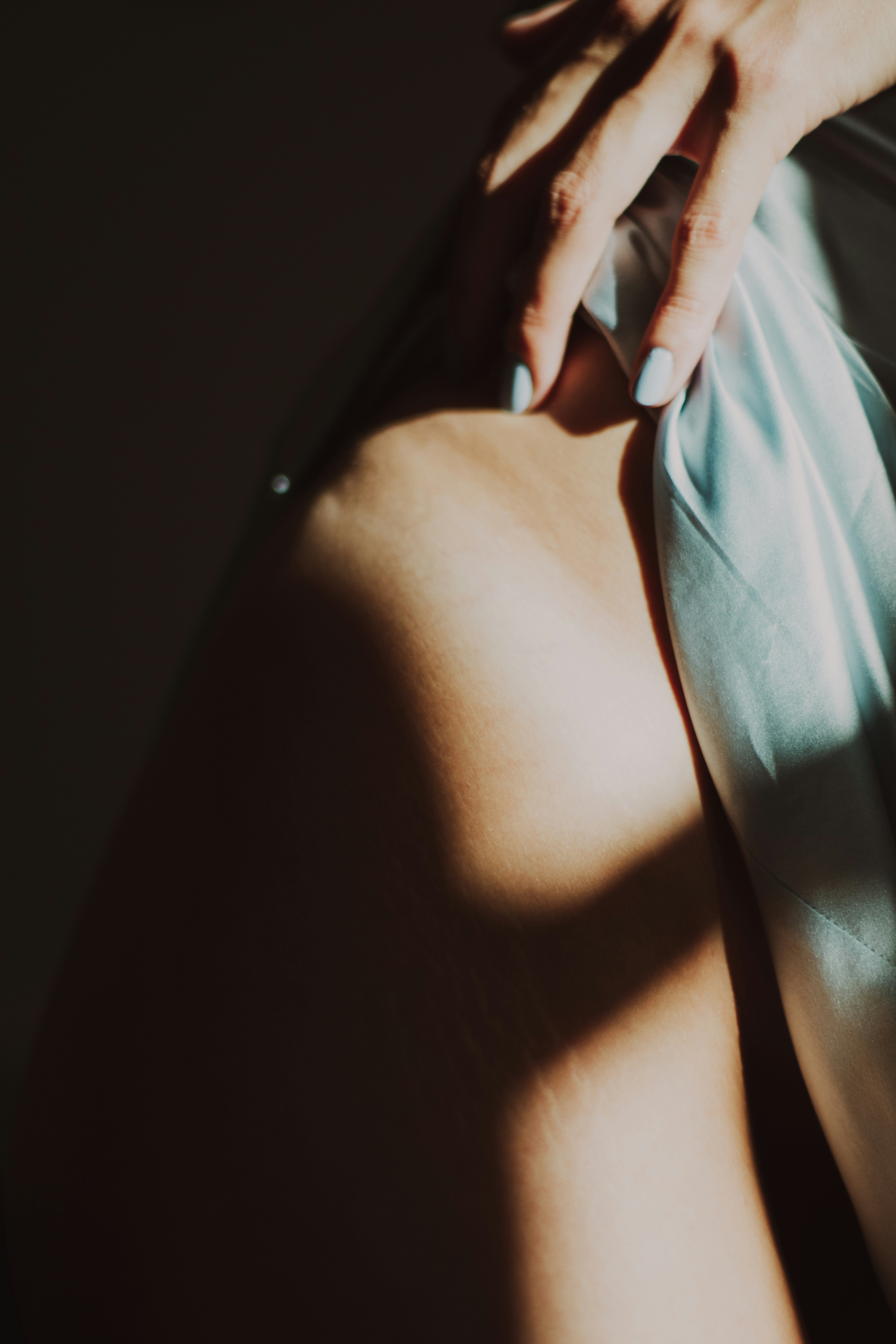 Shadowed Shoulder: A Quiet Moment in Light