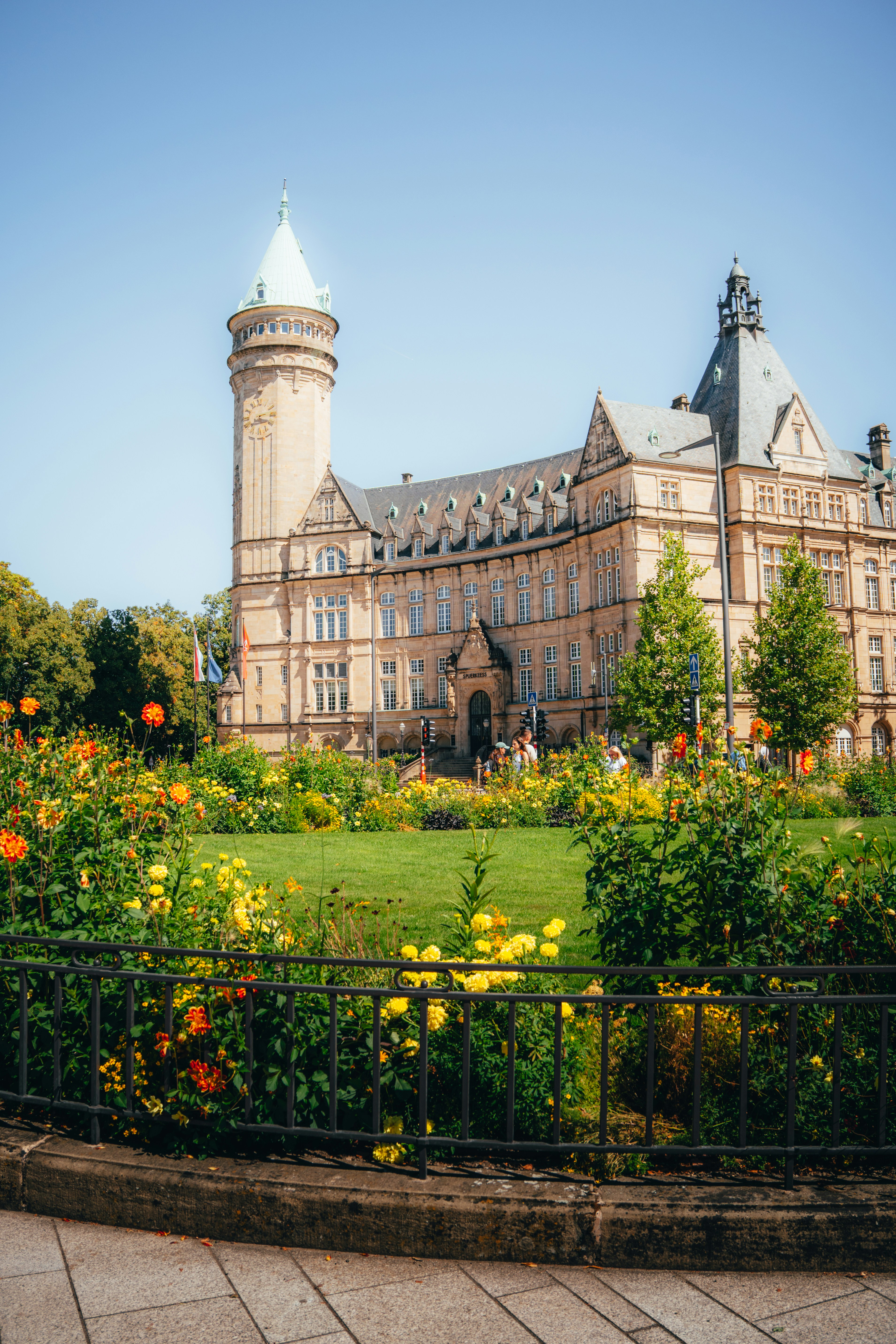 Castle of Roses: A Neo-Gothic Facade Amid a Blooming Park