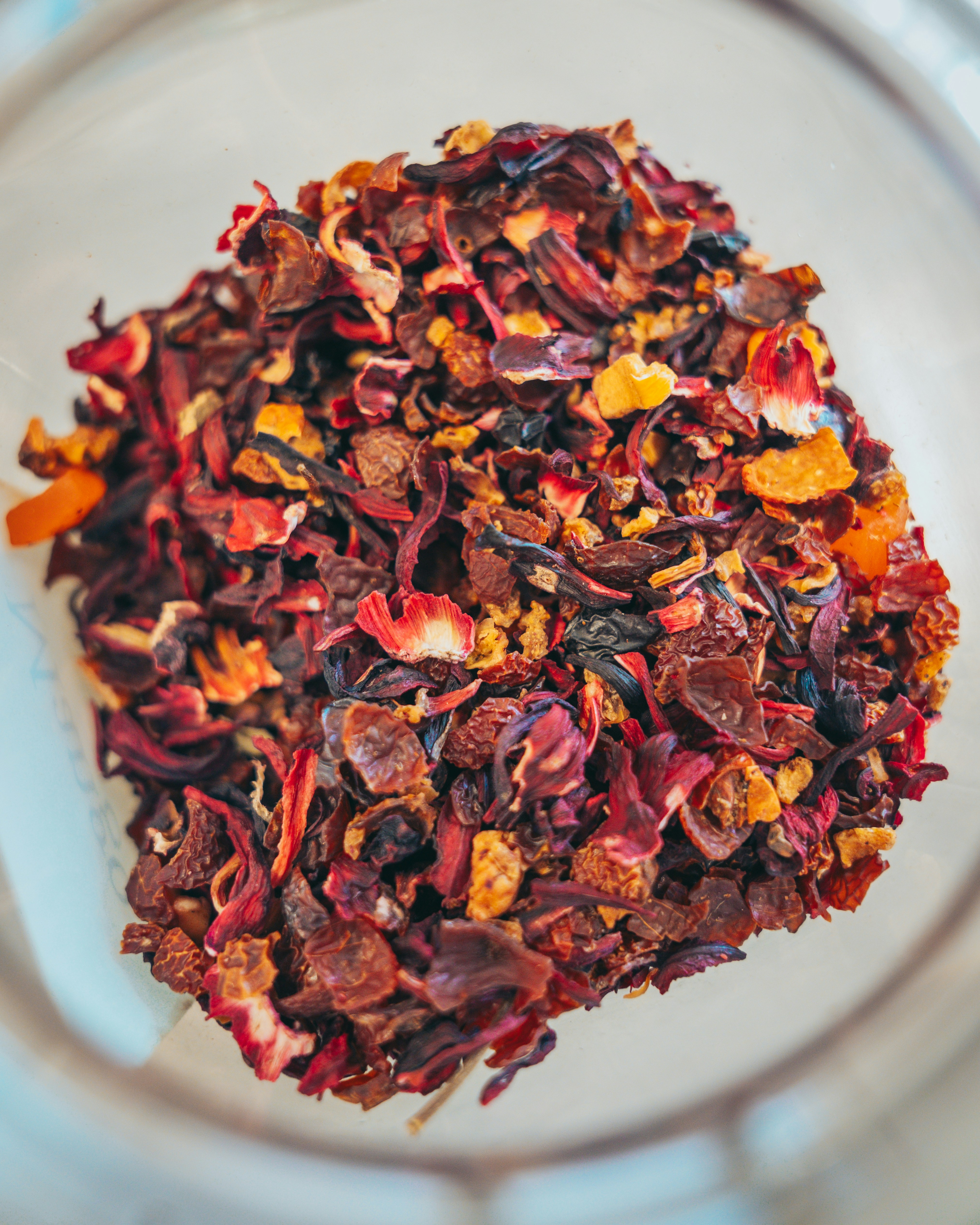 Colorful Tea Petals in a Glass Vessel