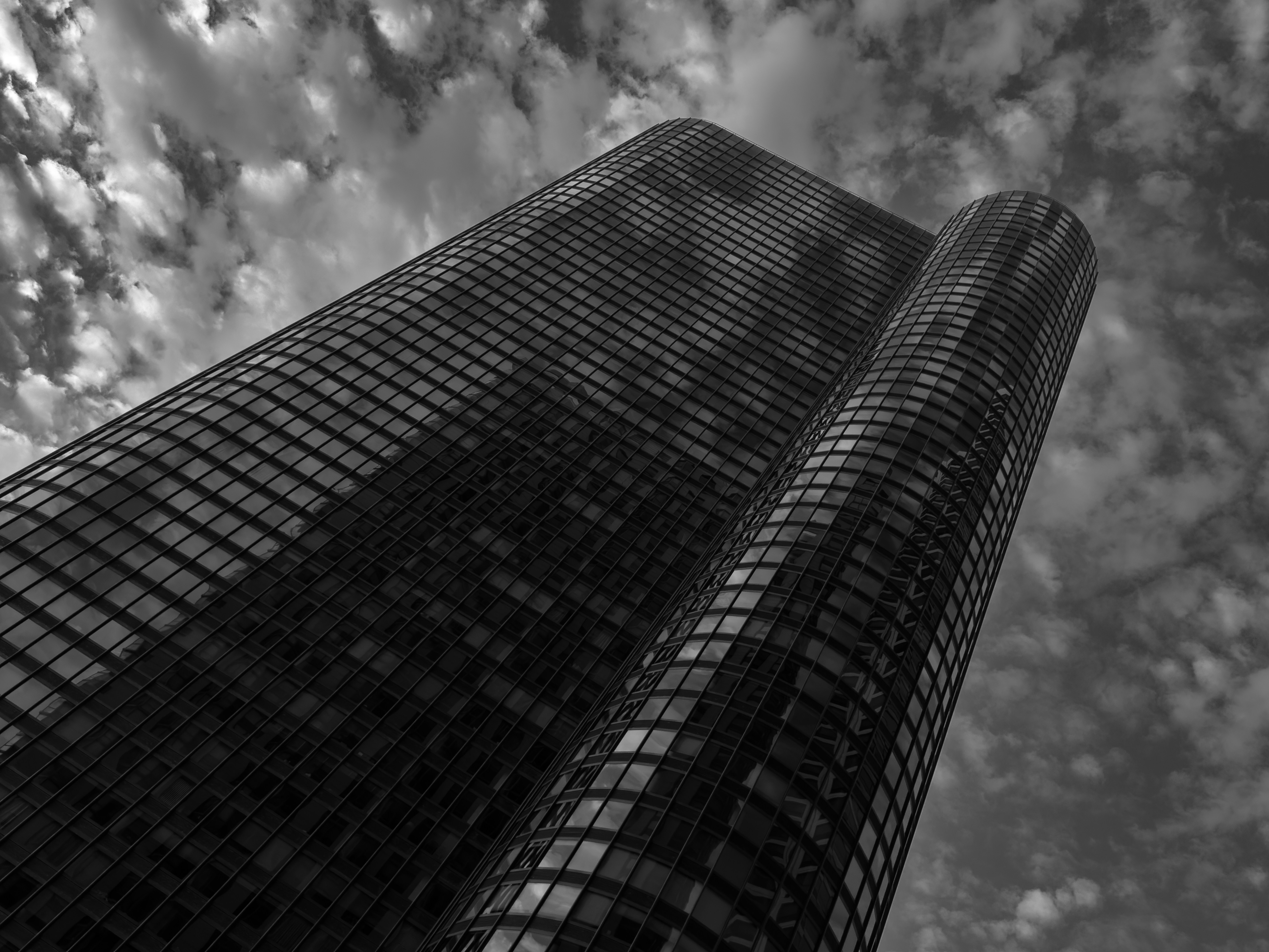 Monolithic Glass Spire Reaching Toward a Dramatic Sky