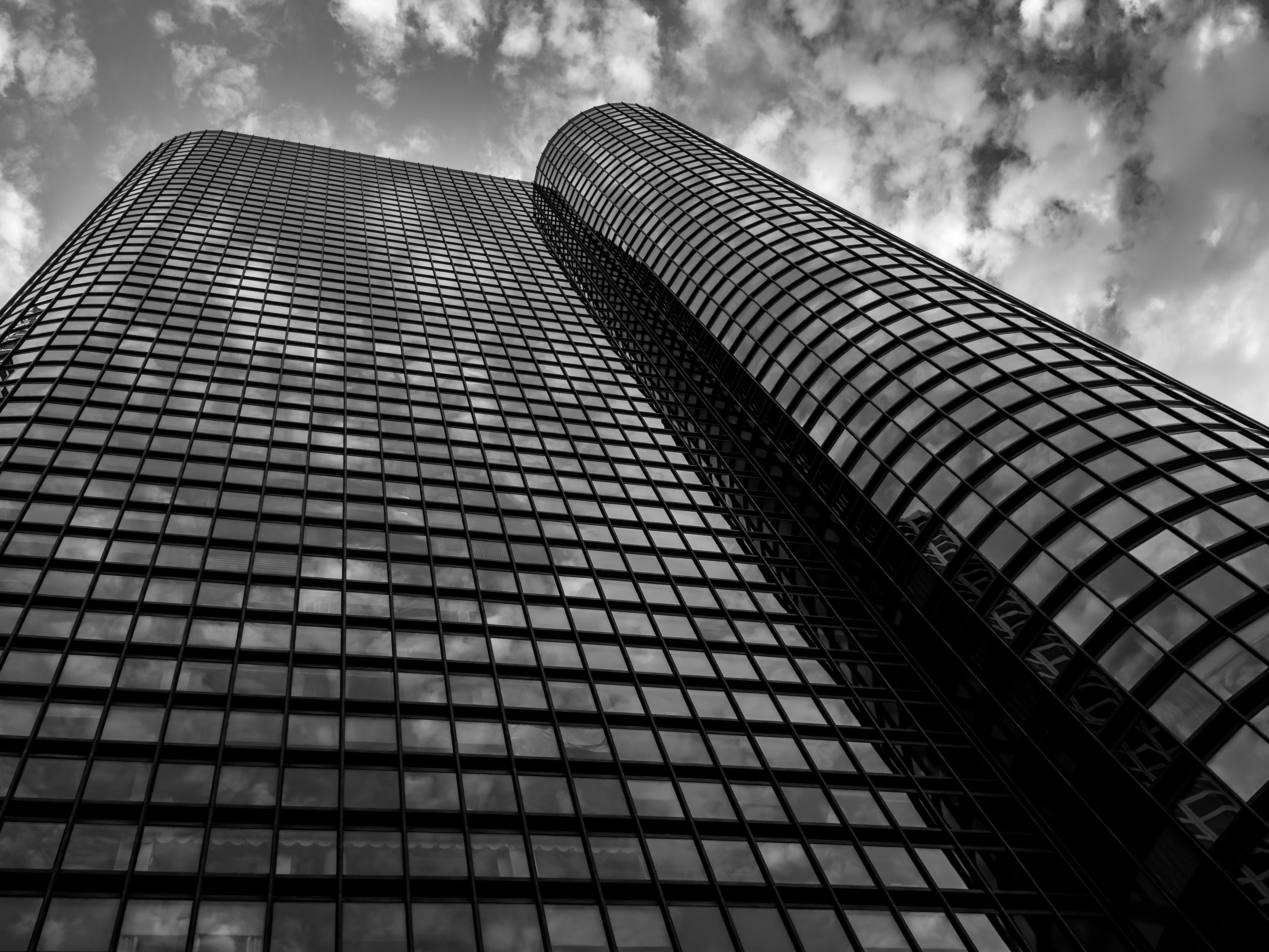 Skyward Arc: A Pair of Glass Towers Reaching for the Light