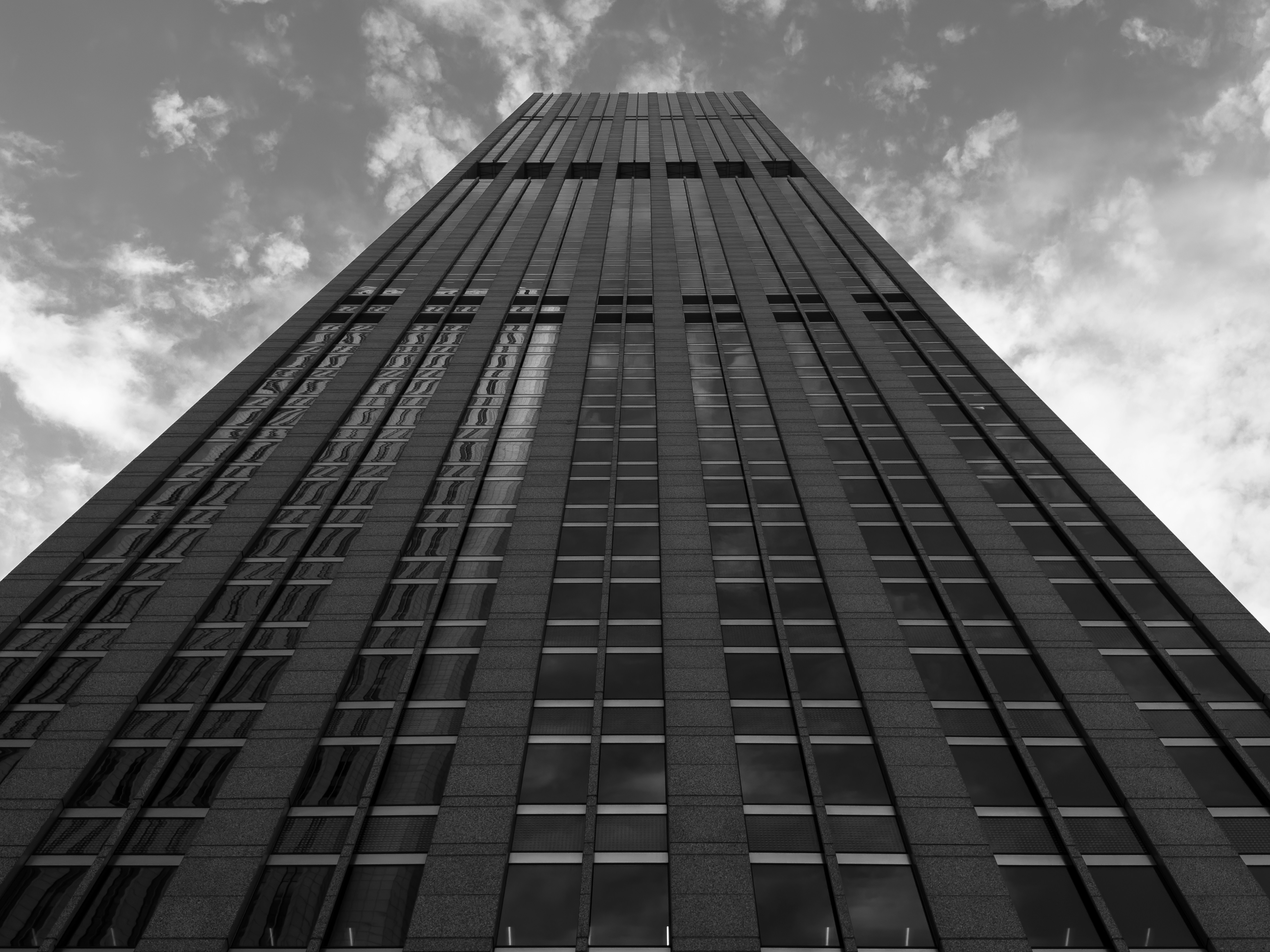 Skyward Monument: A Tower Reaching Through the Cloudscape