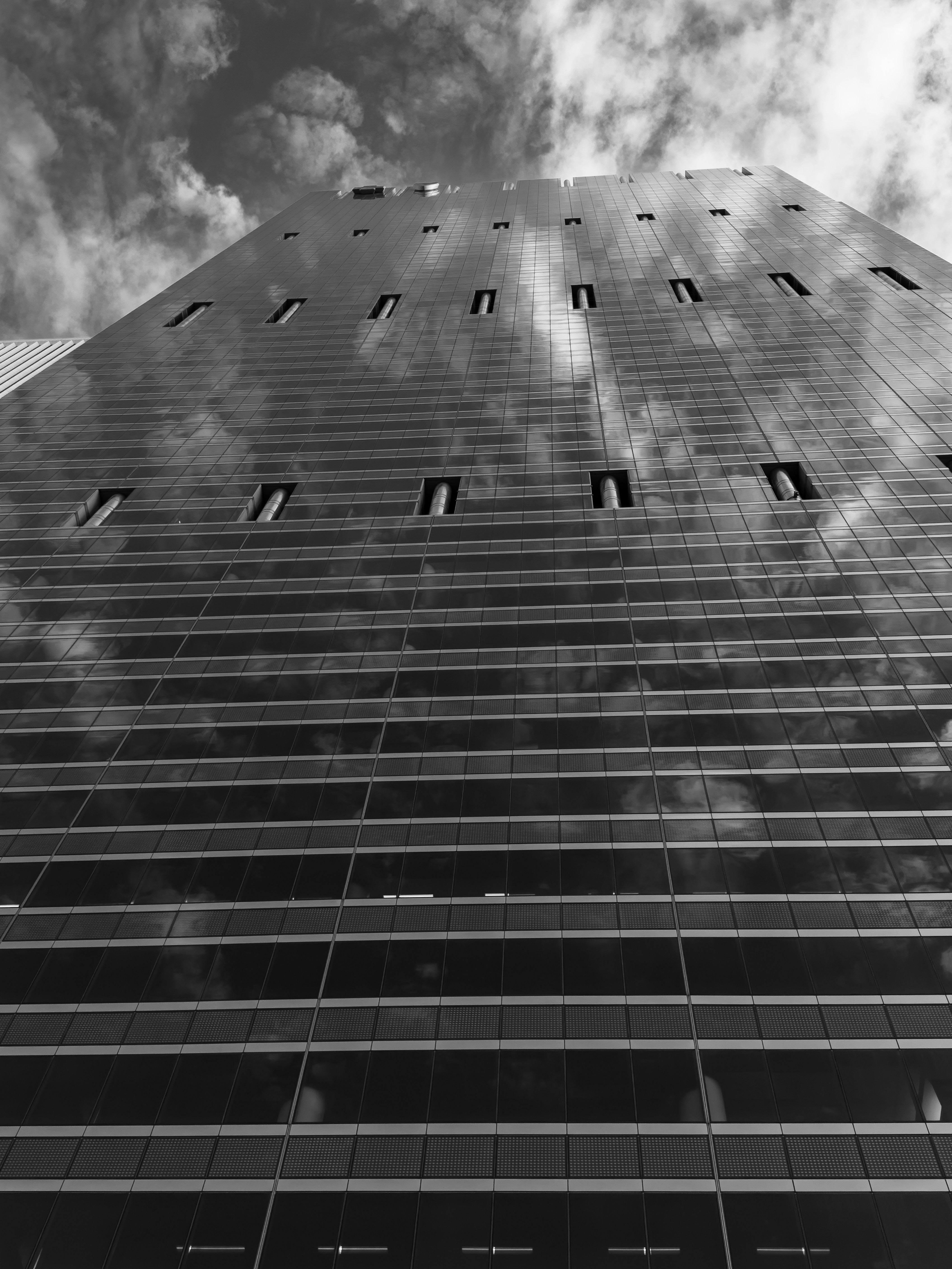 Glass Skyward: The Towered Facade Reaching for Clouds