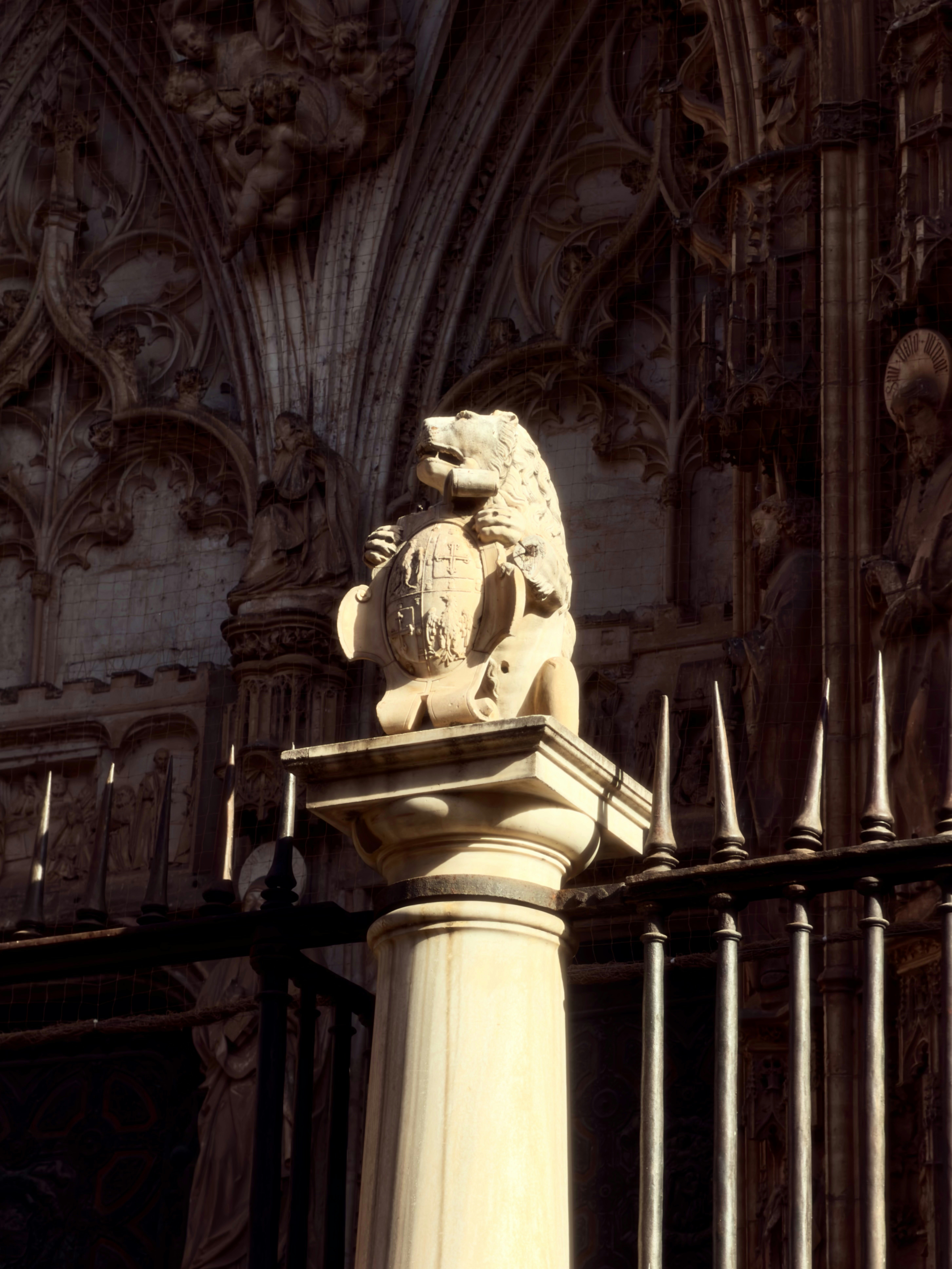 Limestone Lion atop a Cathedral Niche: Guarding the Gate
