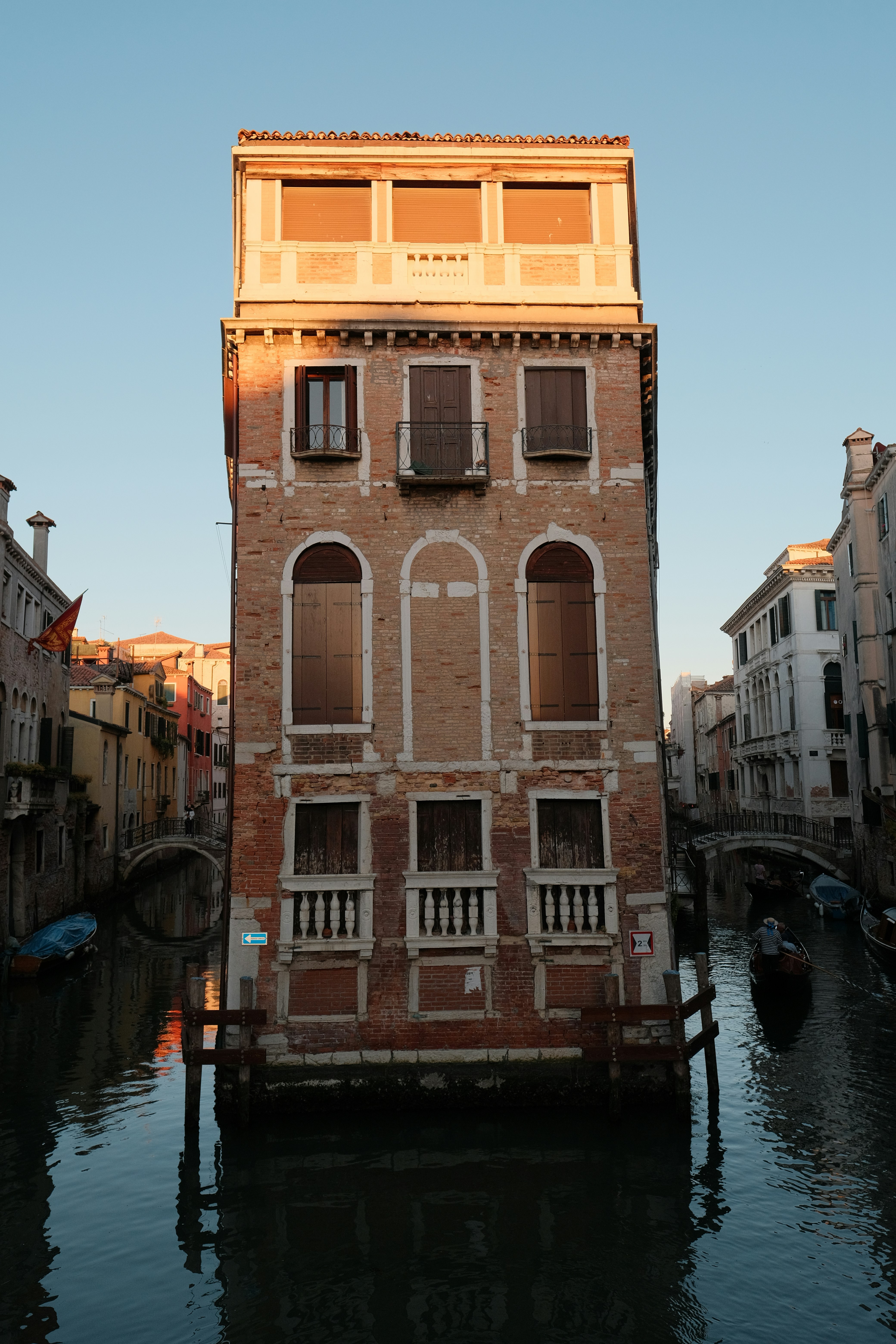 Venetian Tower Rising from the Canal