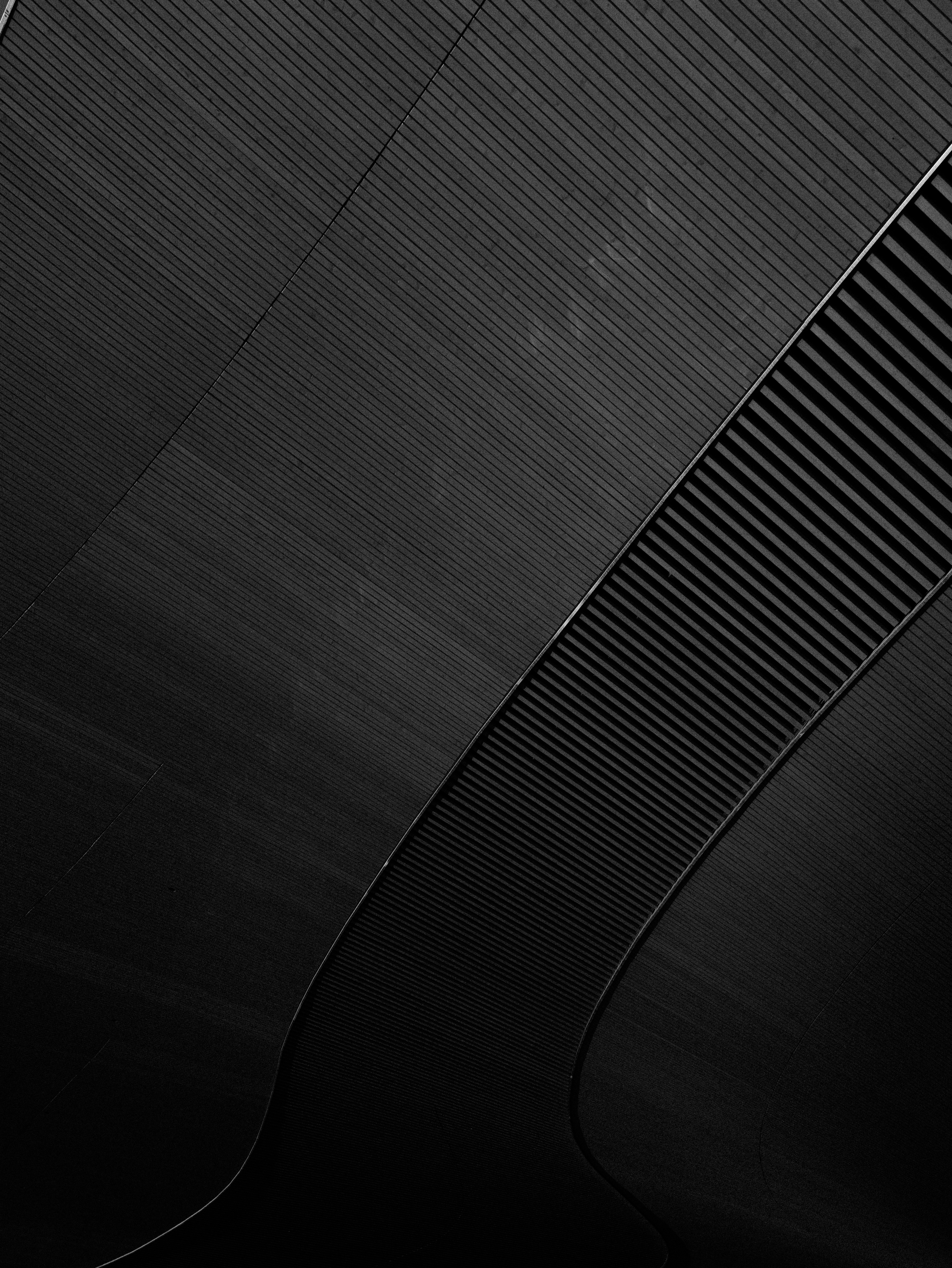 Monochrome Rhythm: A Close-Up of Textured Metal Striations