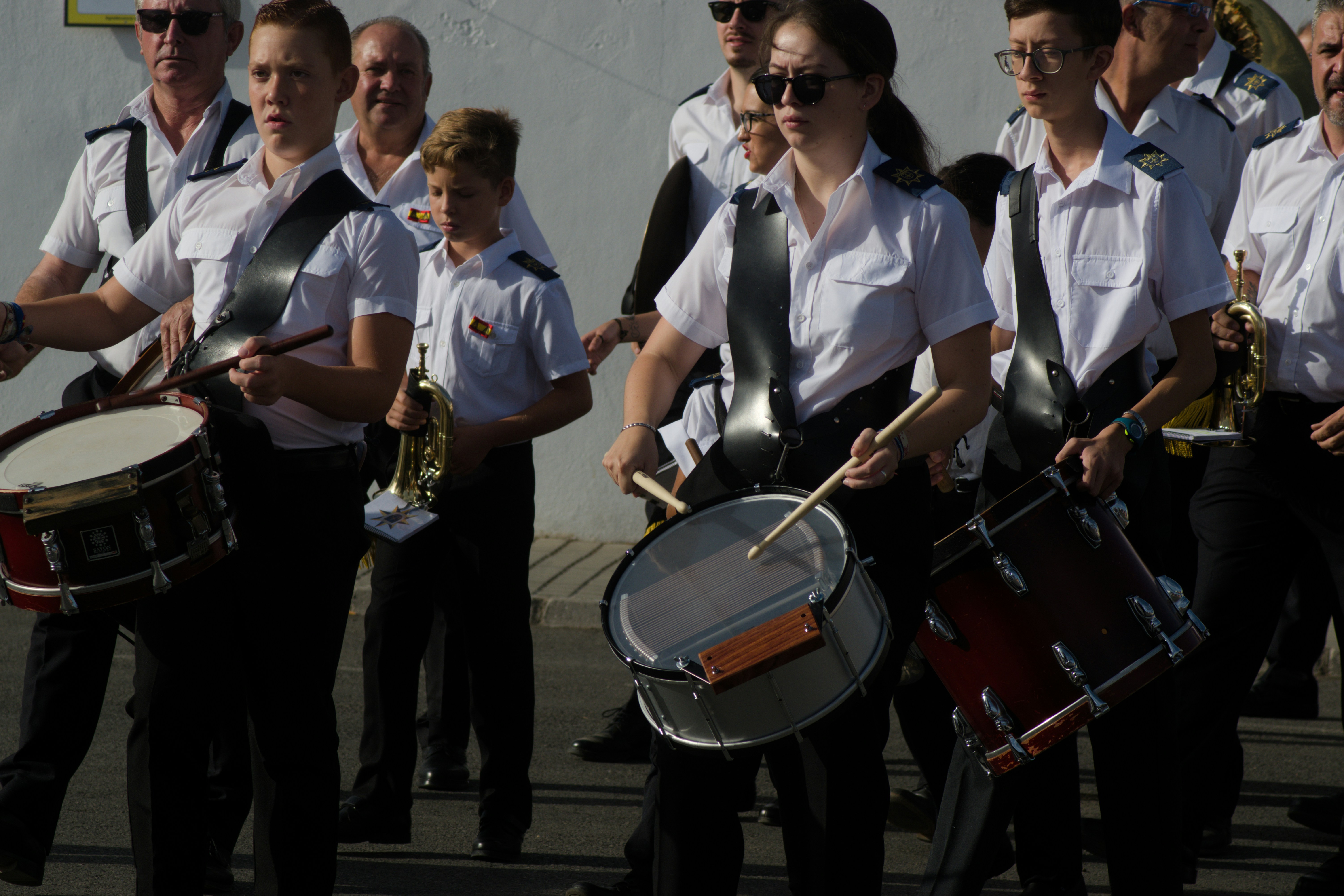 Marching Groove: A Brass Line in Uniform Precision