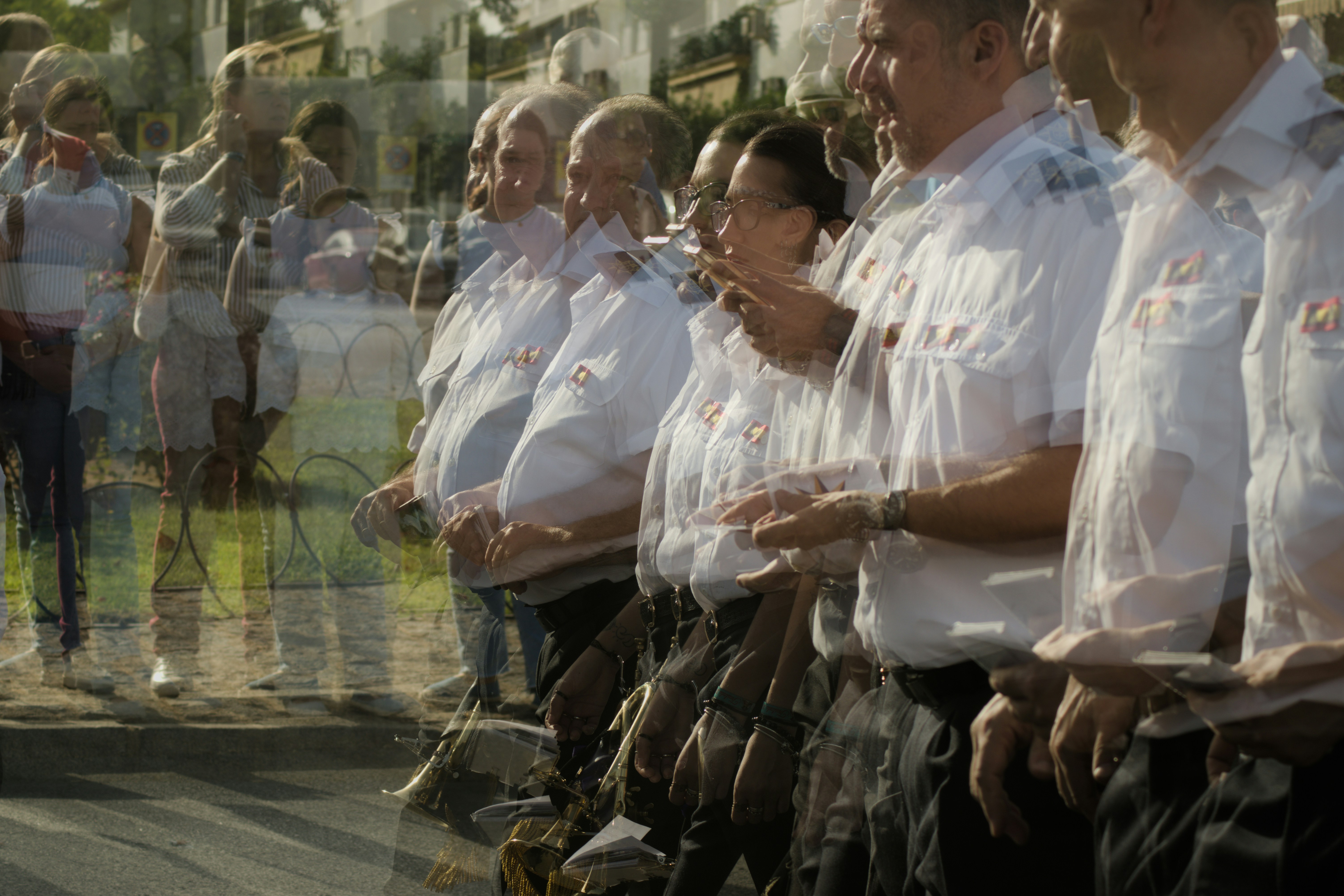 Blurred Steps of Honor: A Multi-Exposure Ceremony Reflected in Motion
