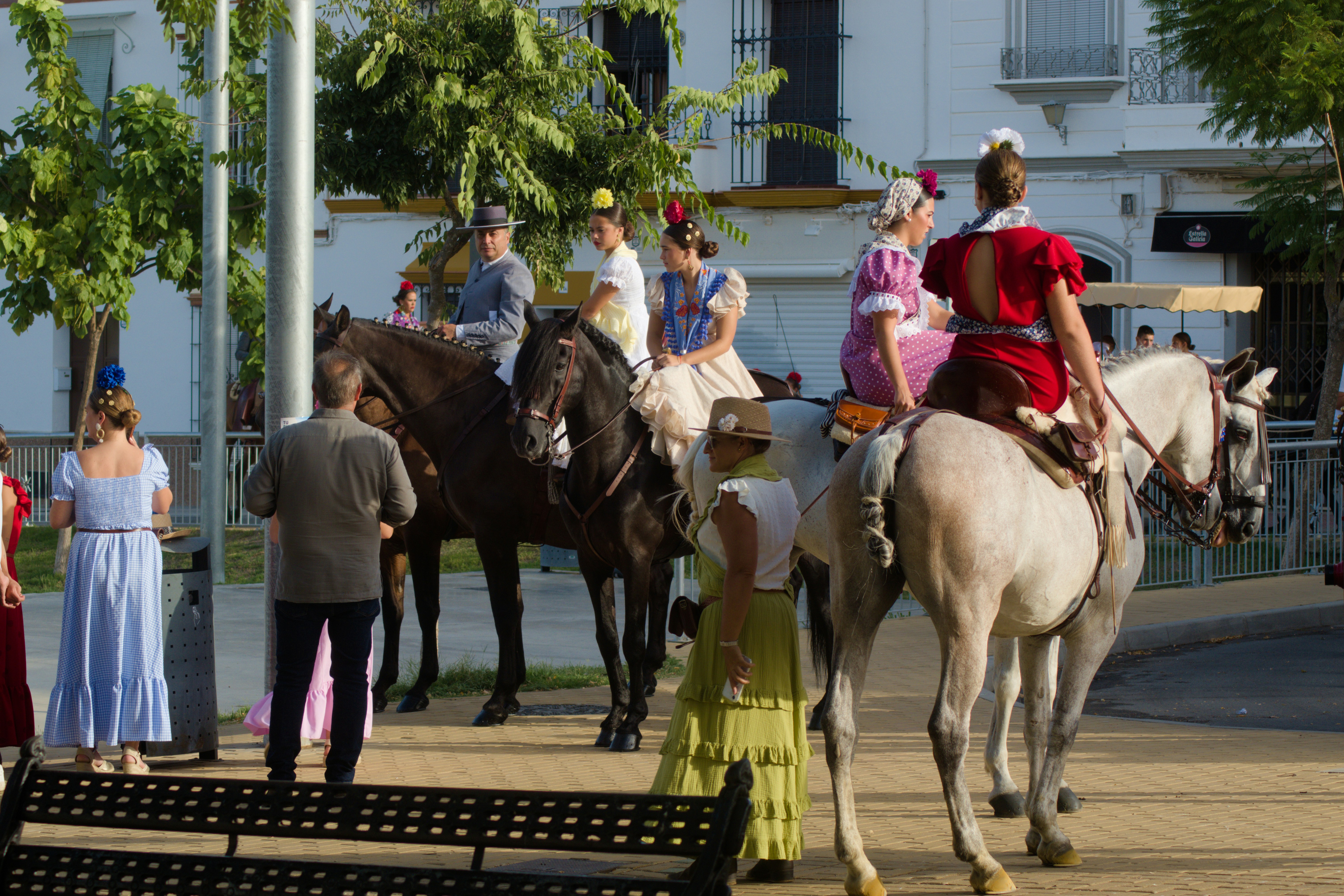 Parade of Dawn: Riders and Attendees Amid Cushioned Shadows
