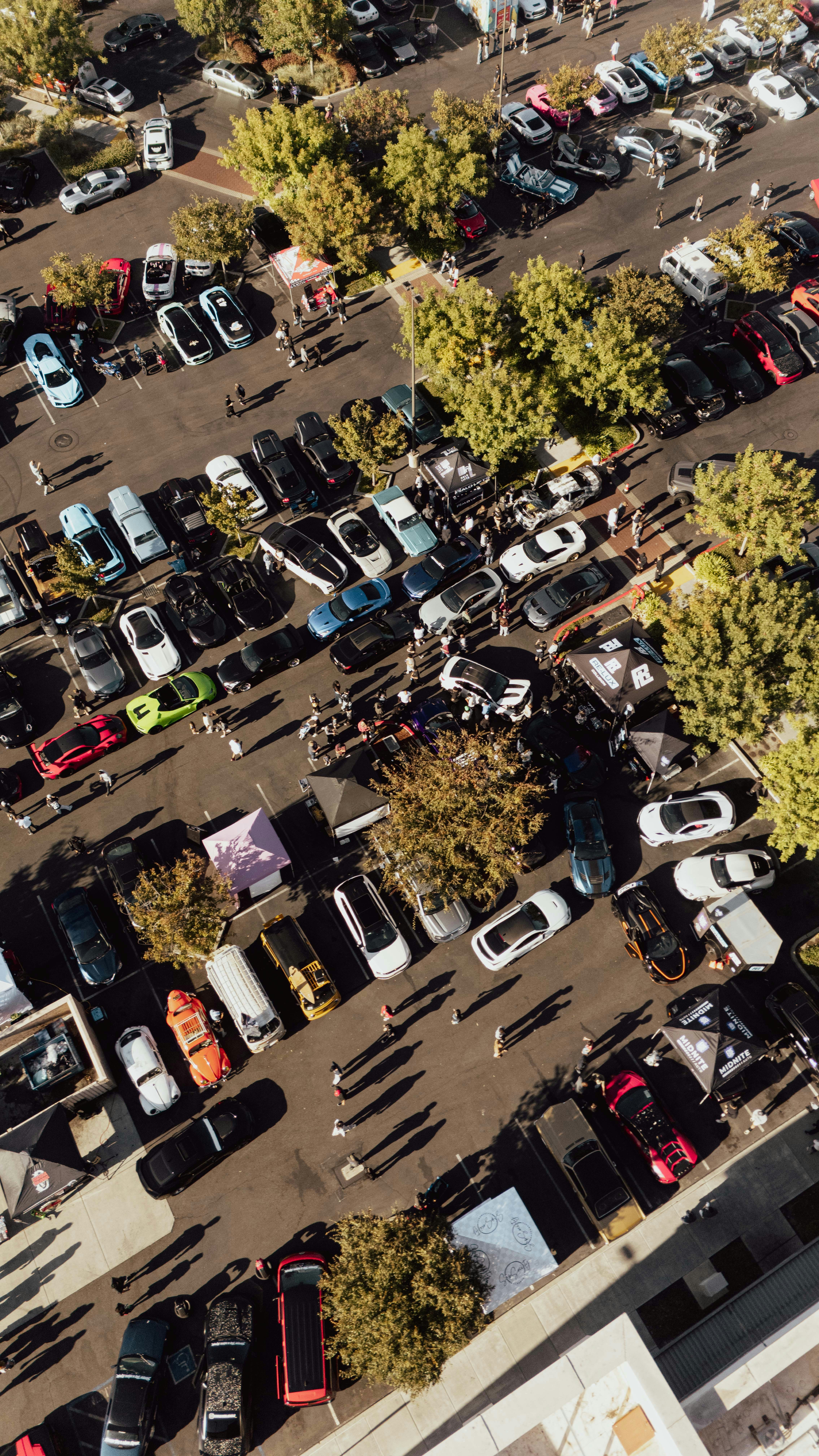 Aerial Car Showdown: Grid of Chrome and Shadow