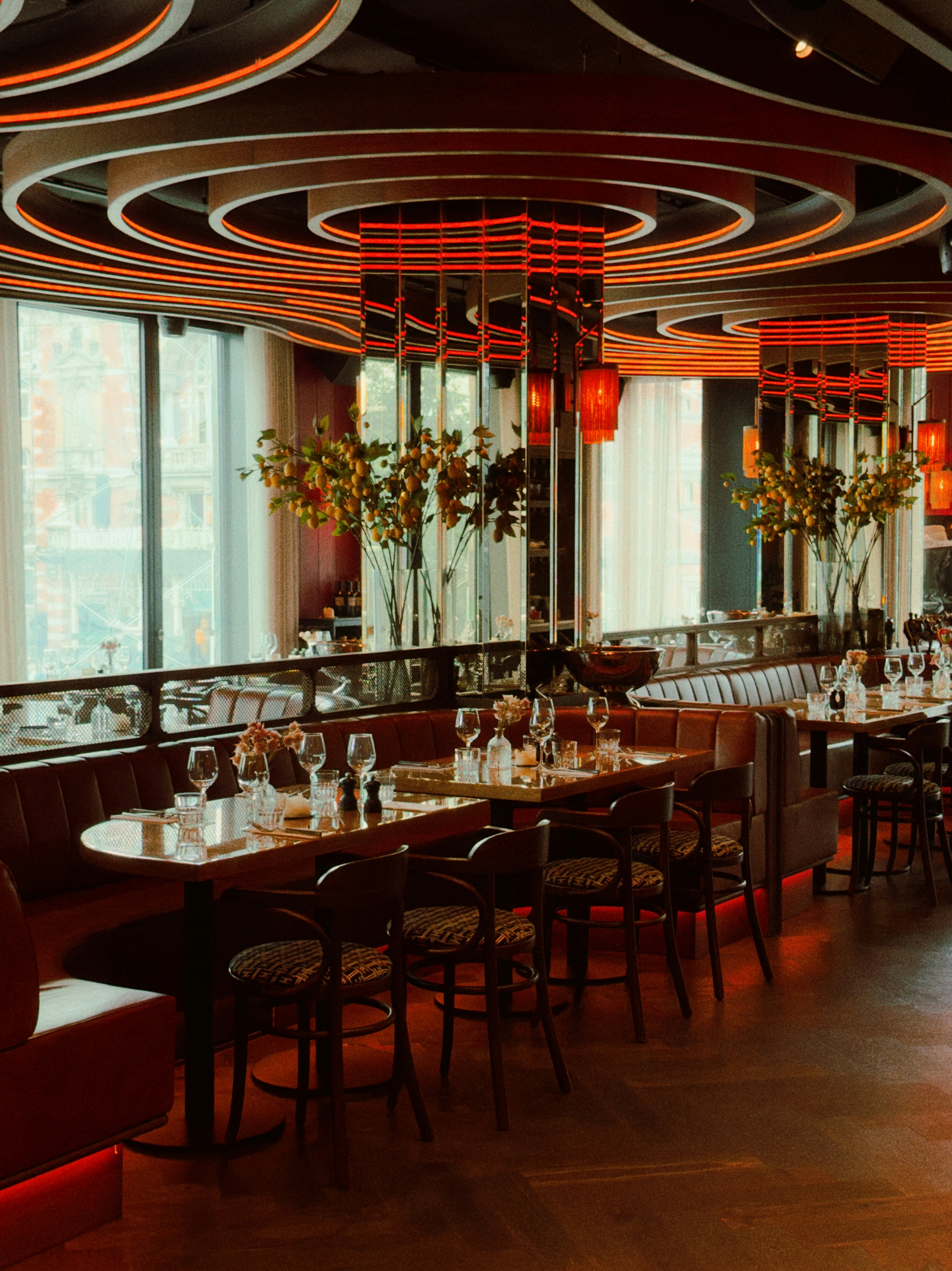 Red Neon Circles Over a Cozy Modern Dining Room