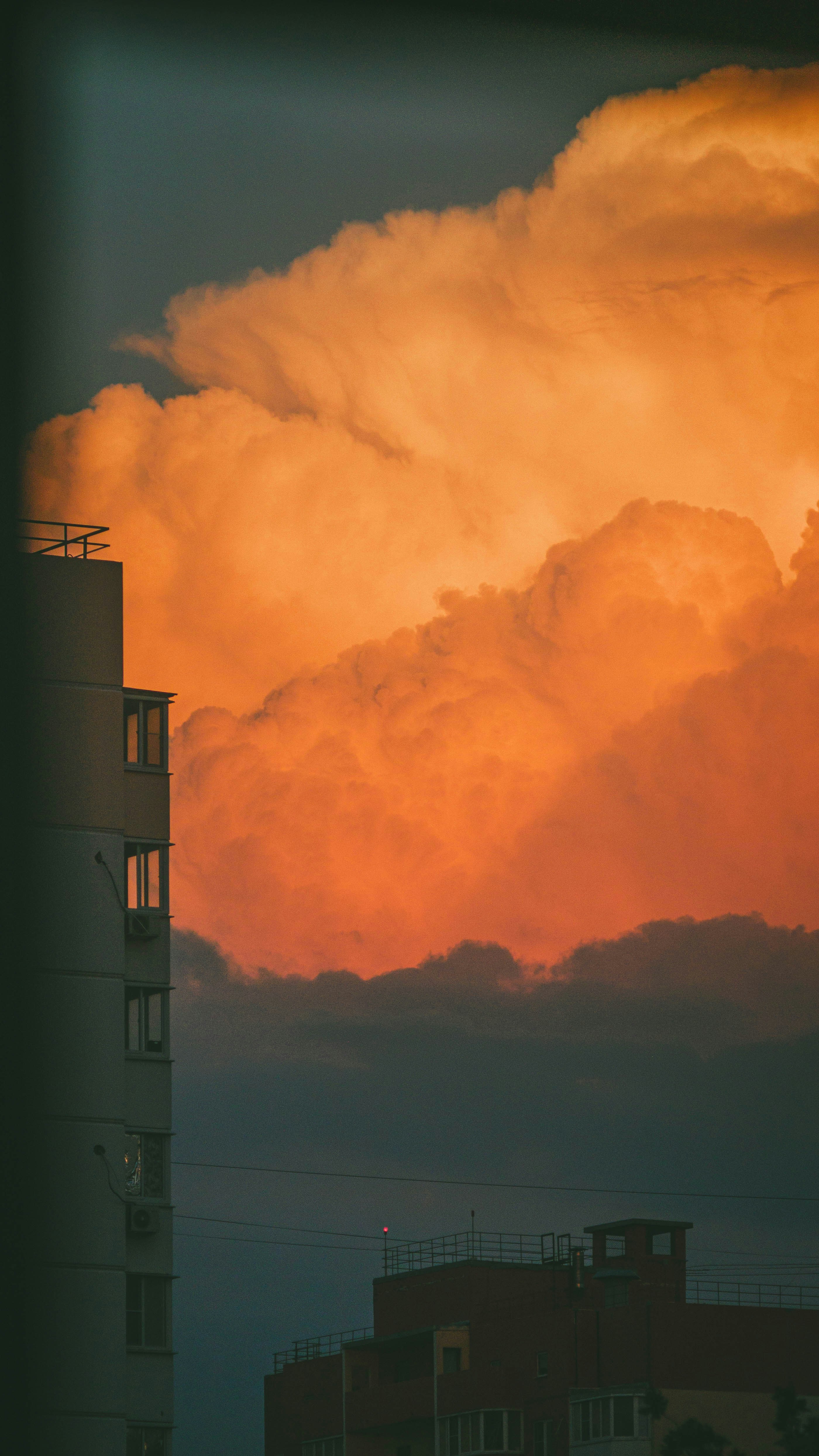 Orange Clouds Over a Sleeping City Block