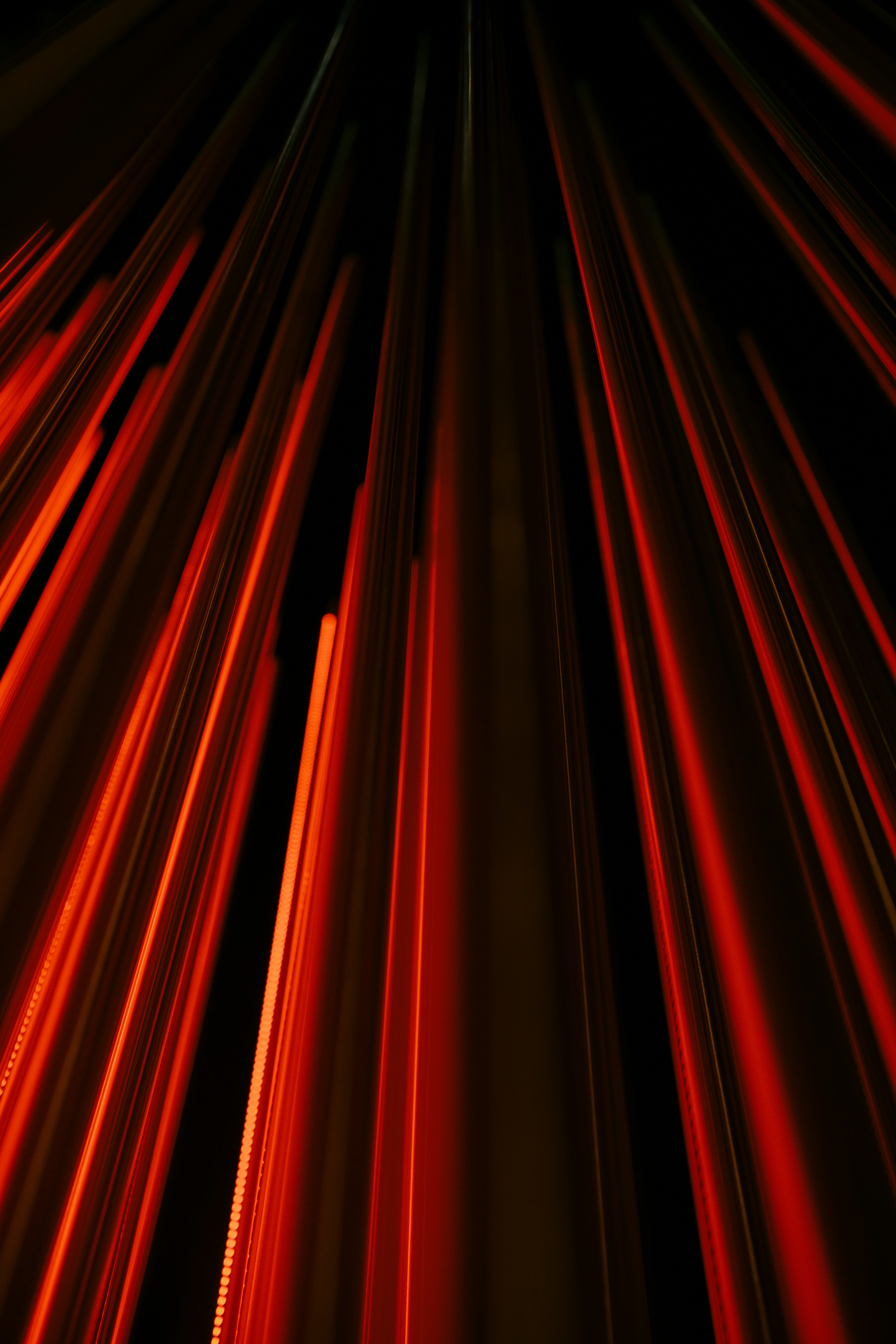 Streaks of Neon Fire: Abstract Light Trails in Motion