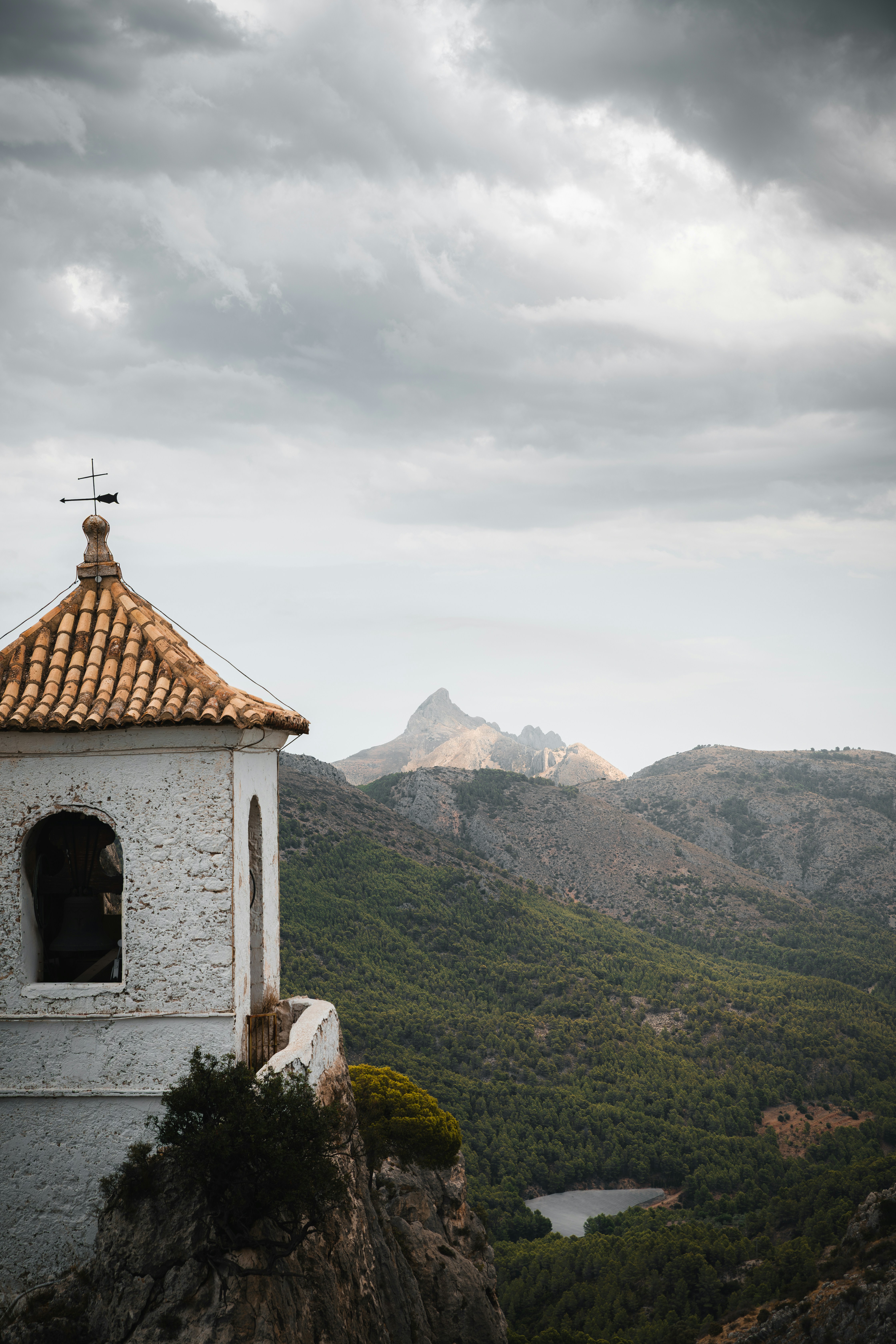 Cliffside Bell Tower Overlooking a Valleyscape