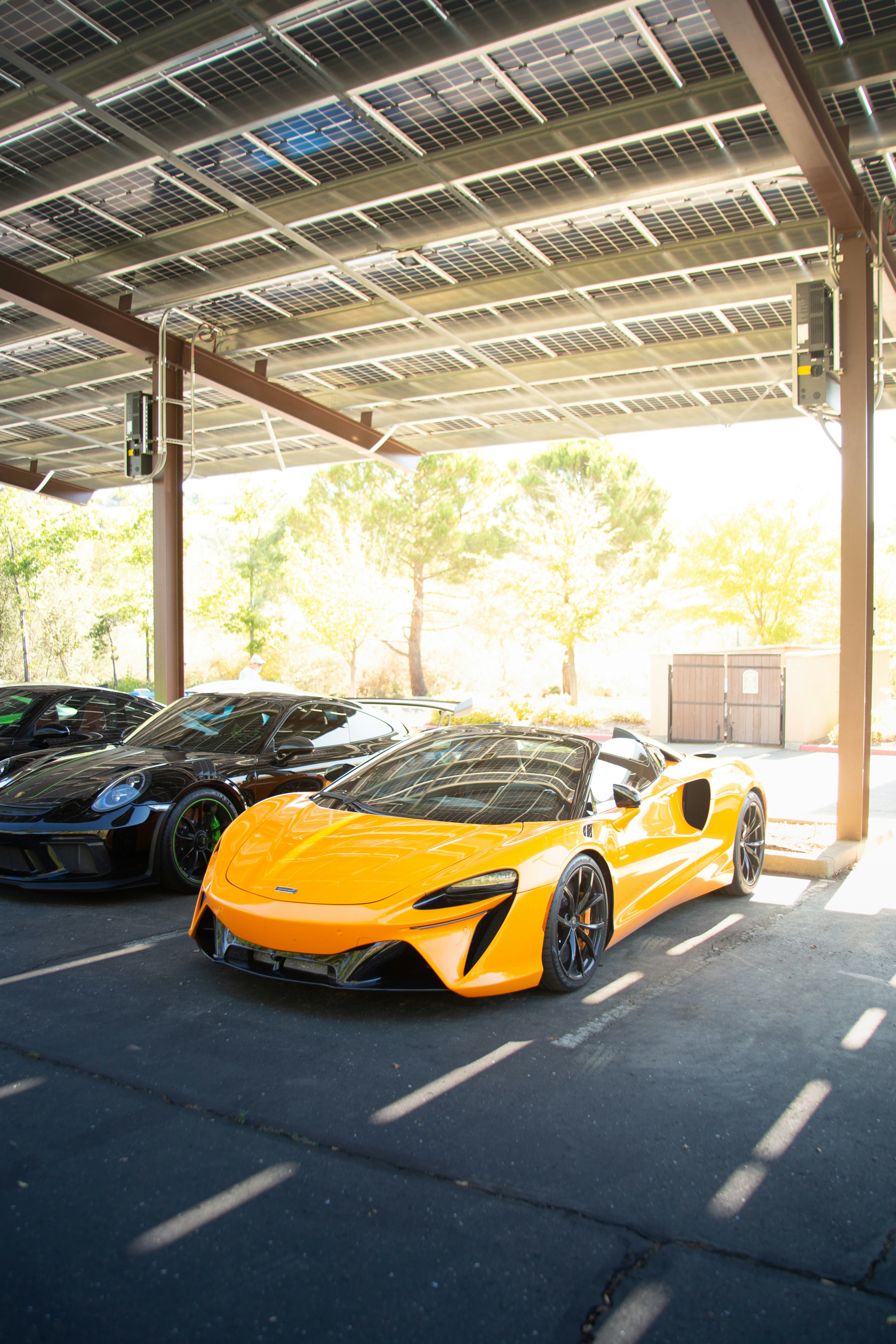Orange McLaren Awakens Under Solar Canopy