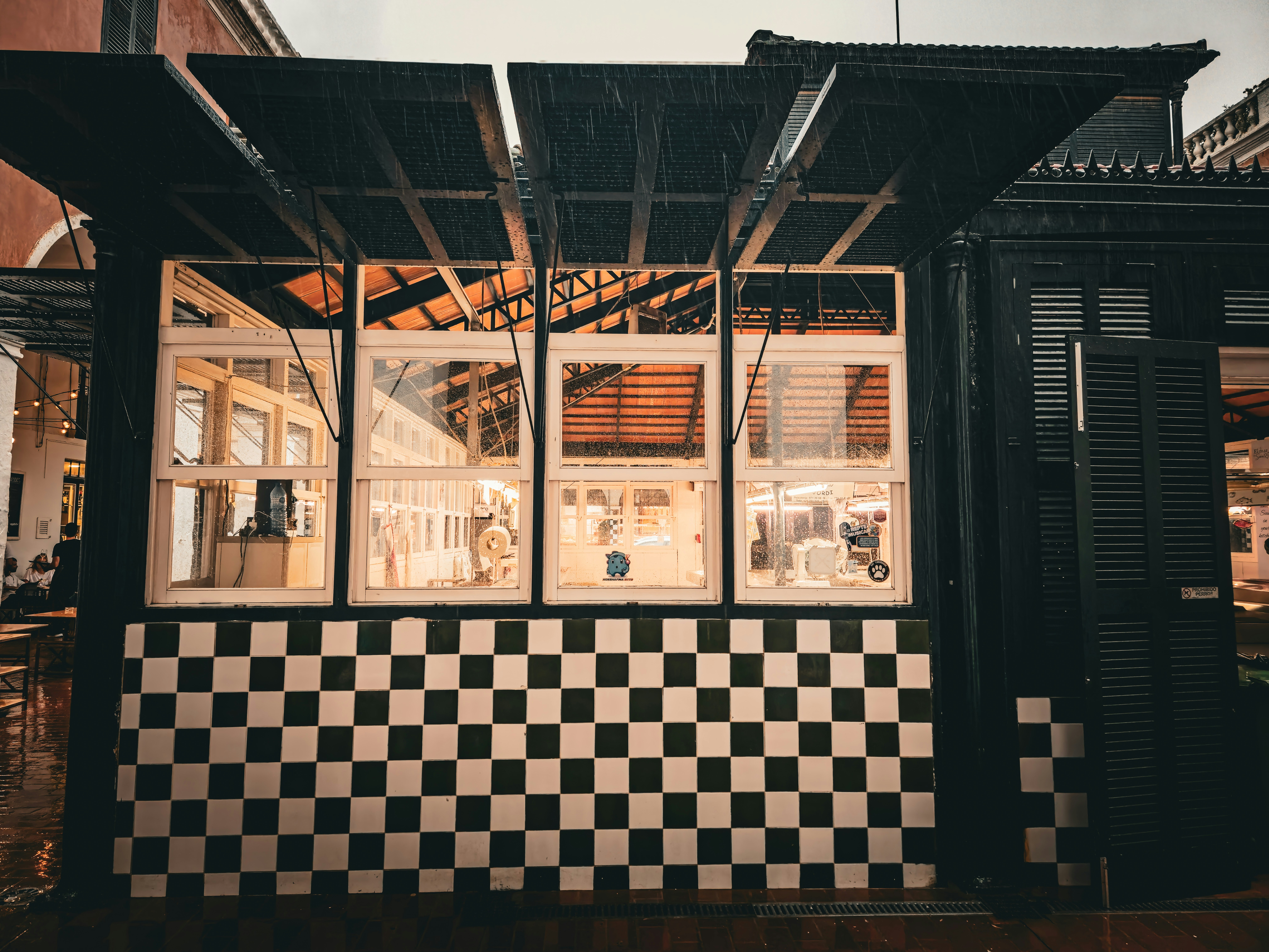 Checkerboard Café Window: A Quiet Corner of Past and Present