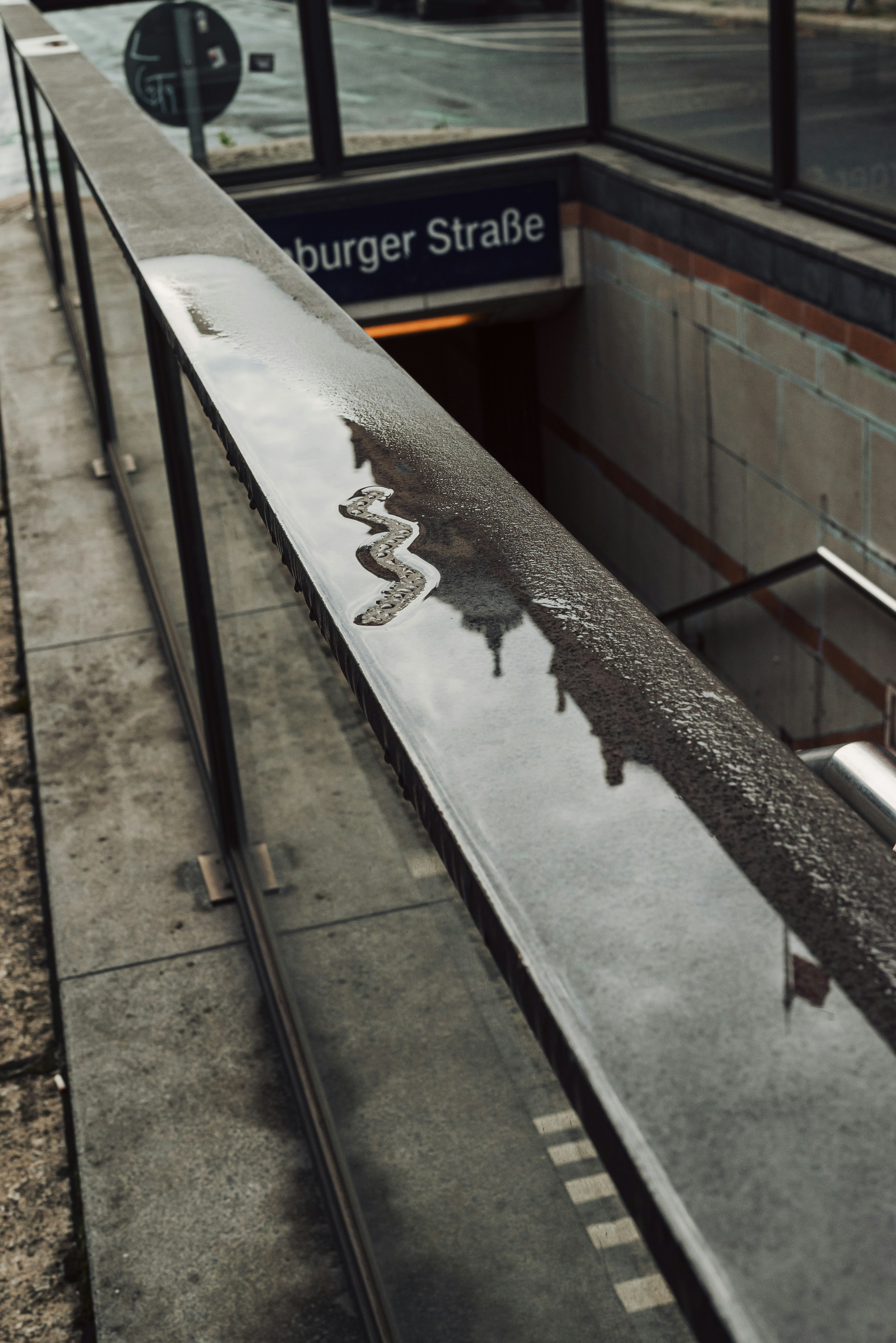 Reflected Path: Evening Corridor Above Burger Street