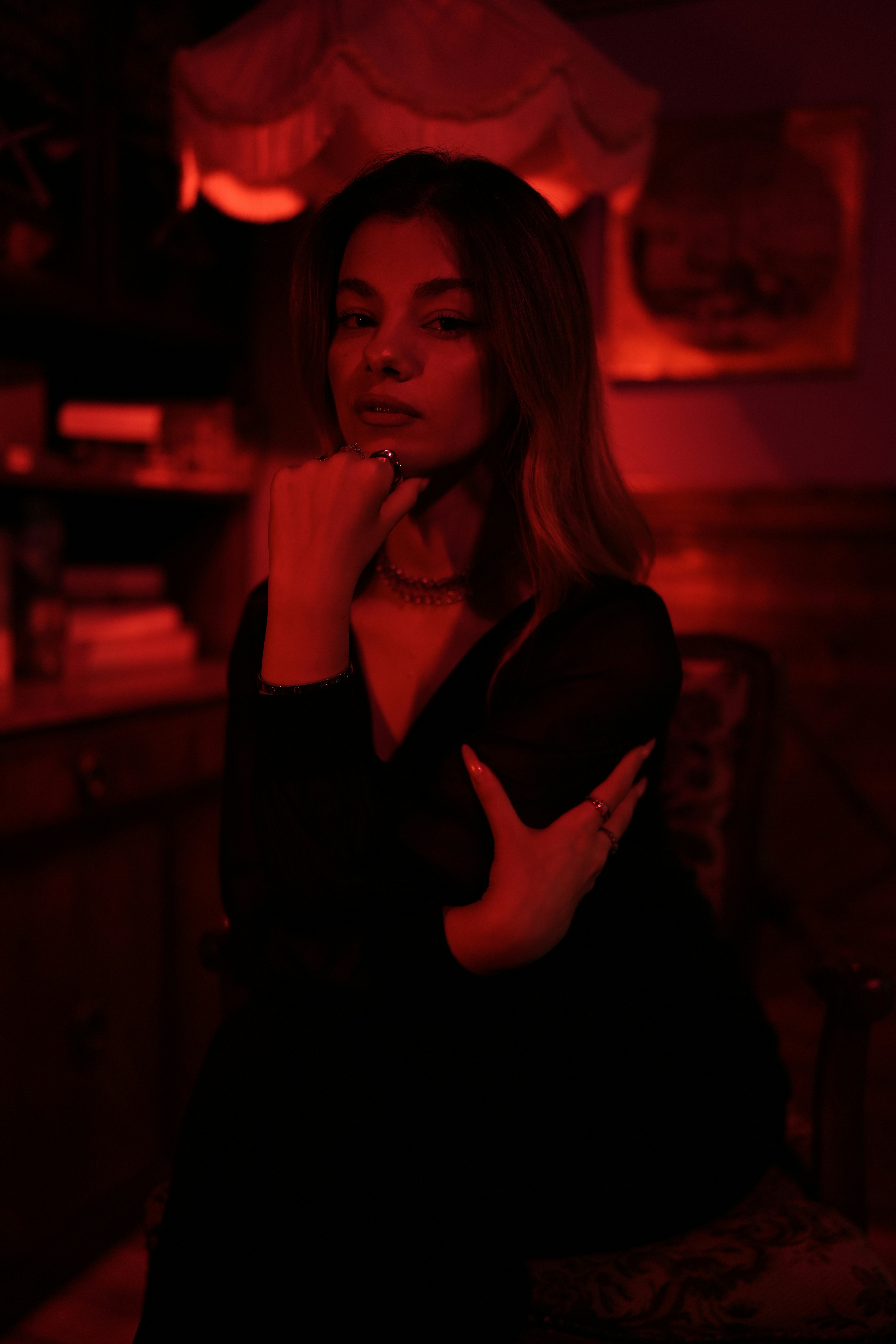 Crimson Quiet: A Portrait in Low Light