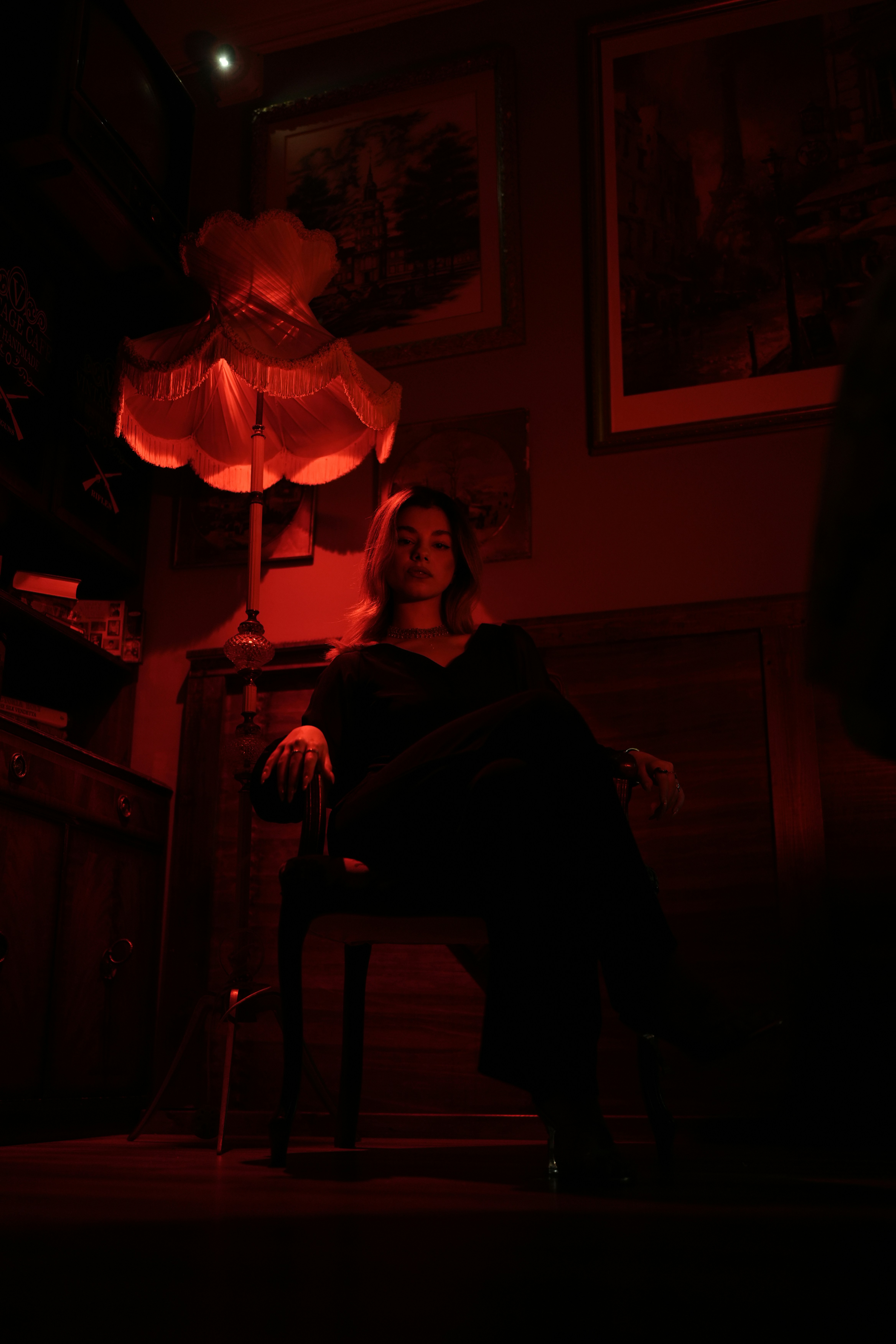 Red-lit Reverie: The Quiet Authority of a Darkened Lounge