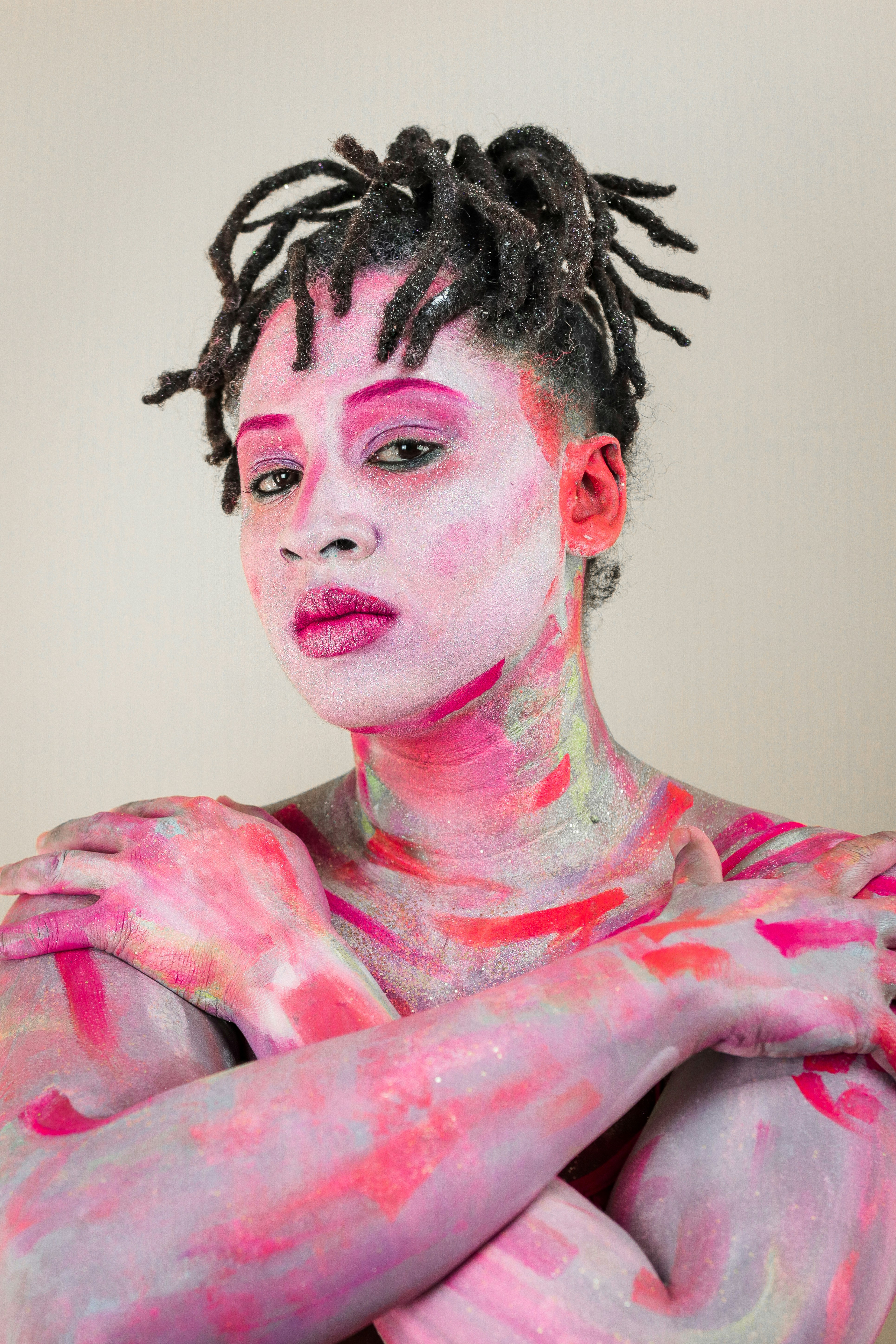 Painted Portrait: Neon Flesh and Dreadlocked Silence