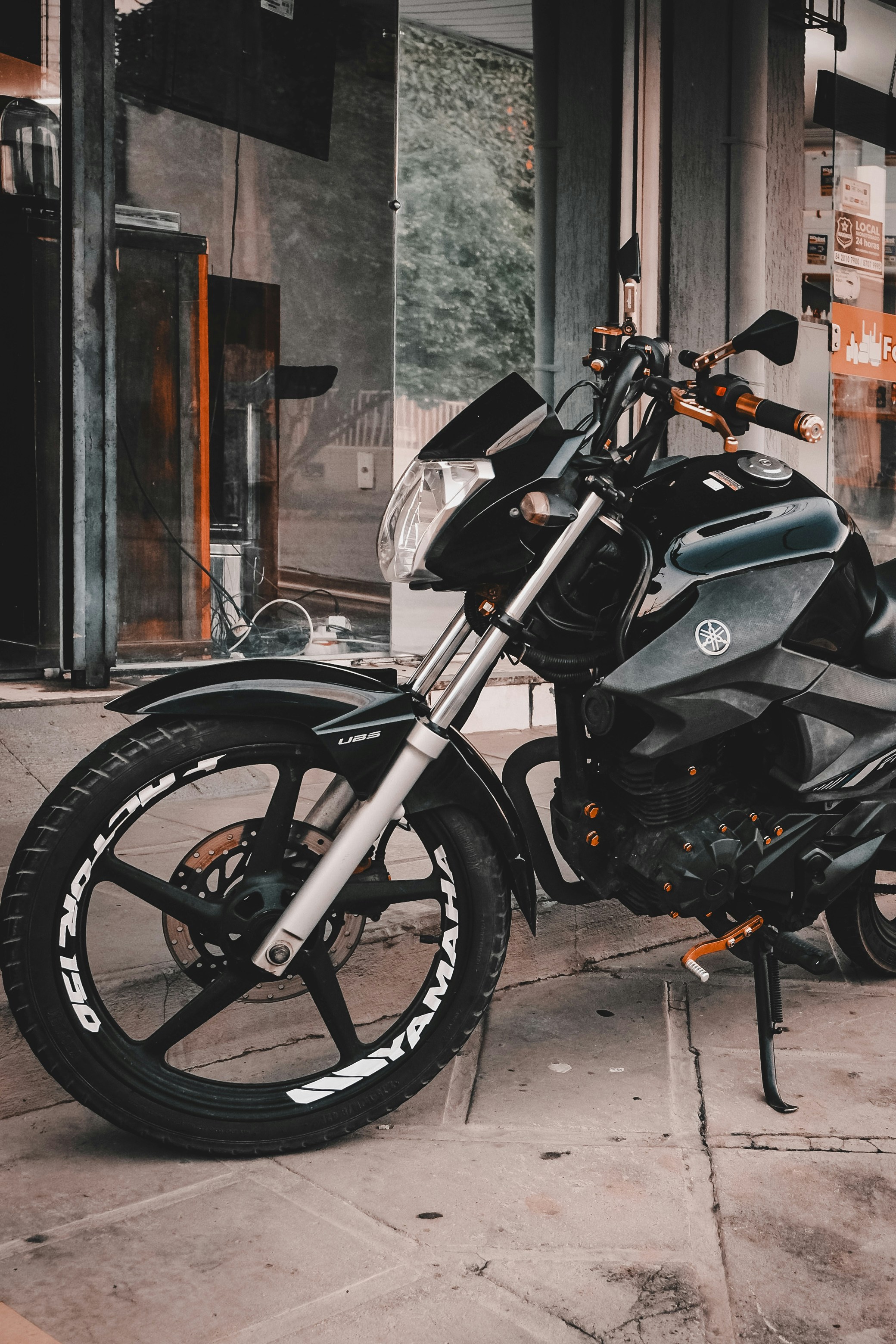 Midnight Steel: A Yamaha Street Machine Resting on City Concrete