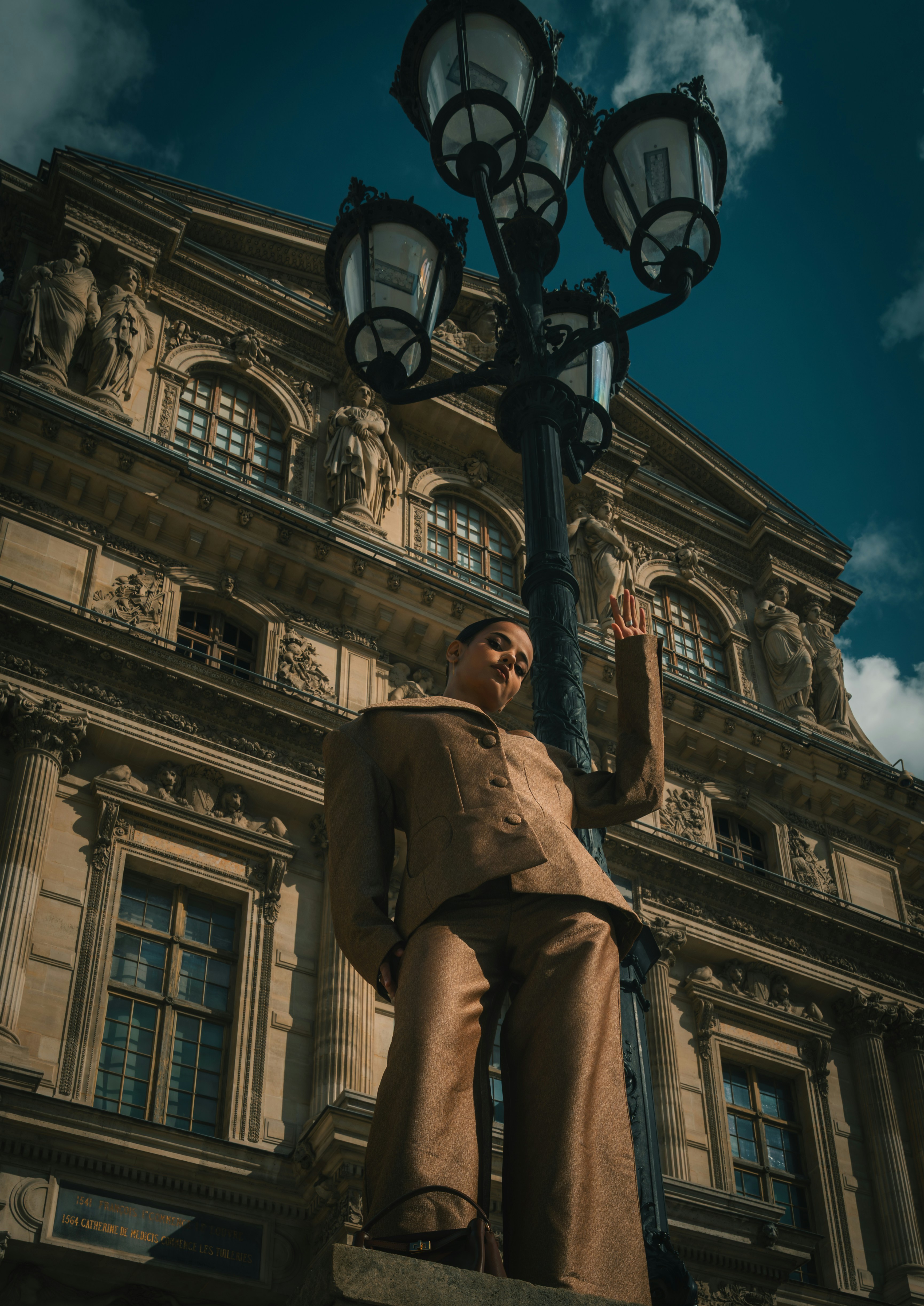 Stance Under the City Lantern: A Poised Figure Against Baroque Facades