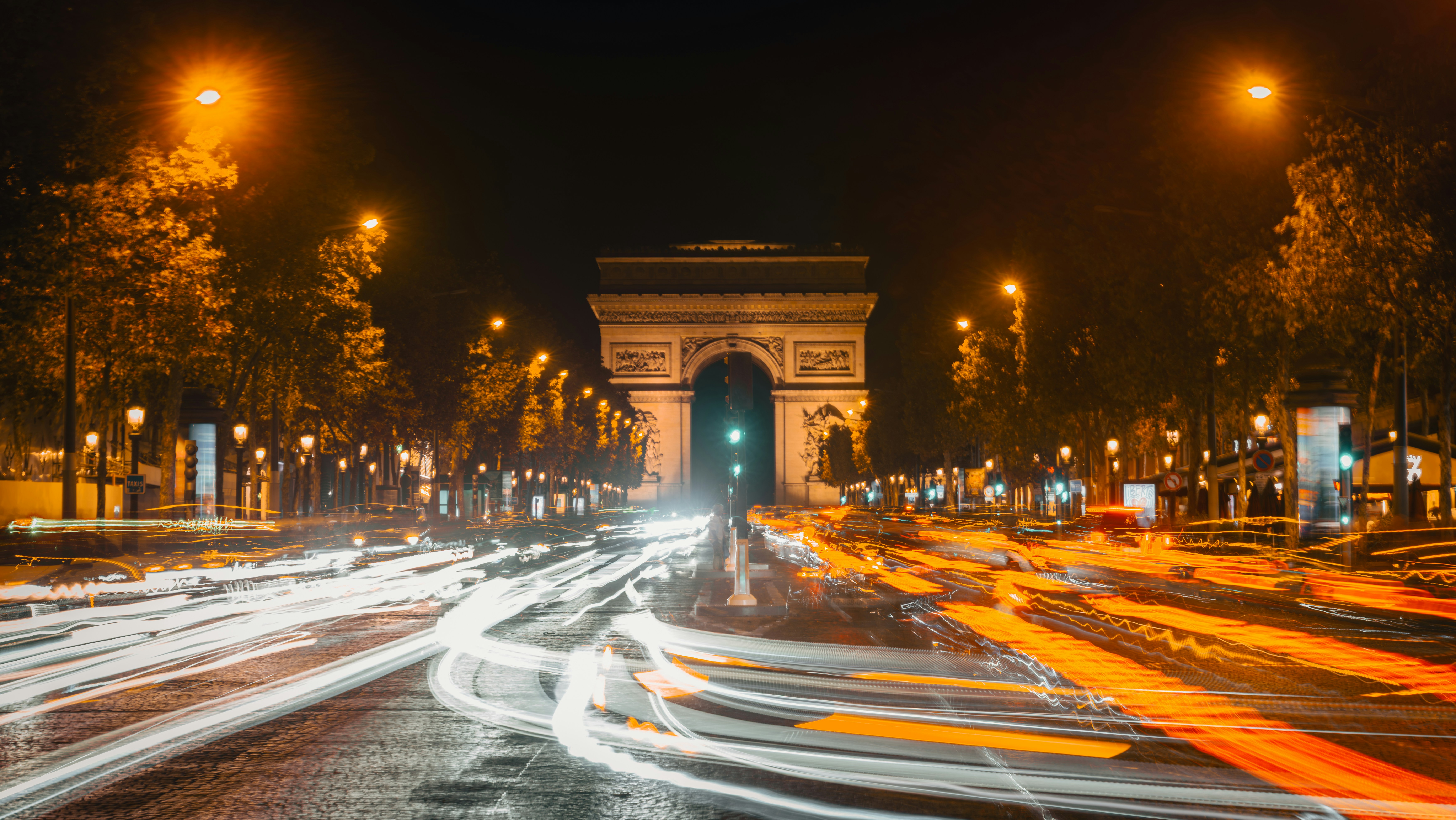 Arcade of Light: The Arc de Triomphe in a River of Night